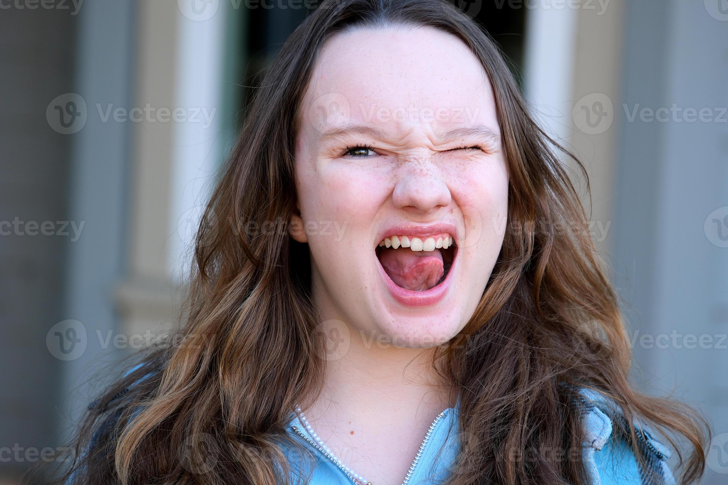 Make Faces Stick Out Tongue Close One Eye Teenage Girl Laughing Joking