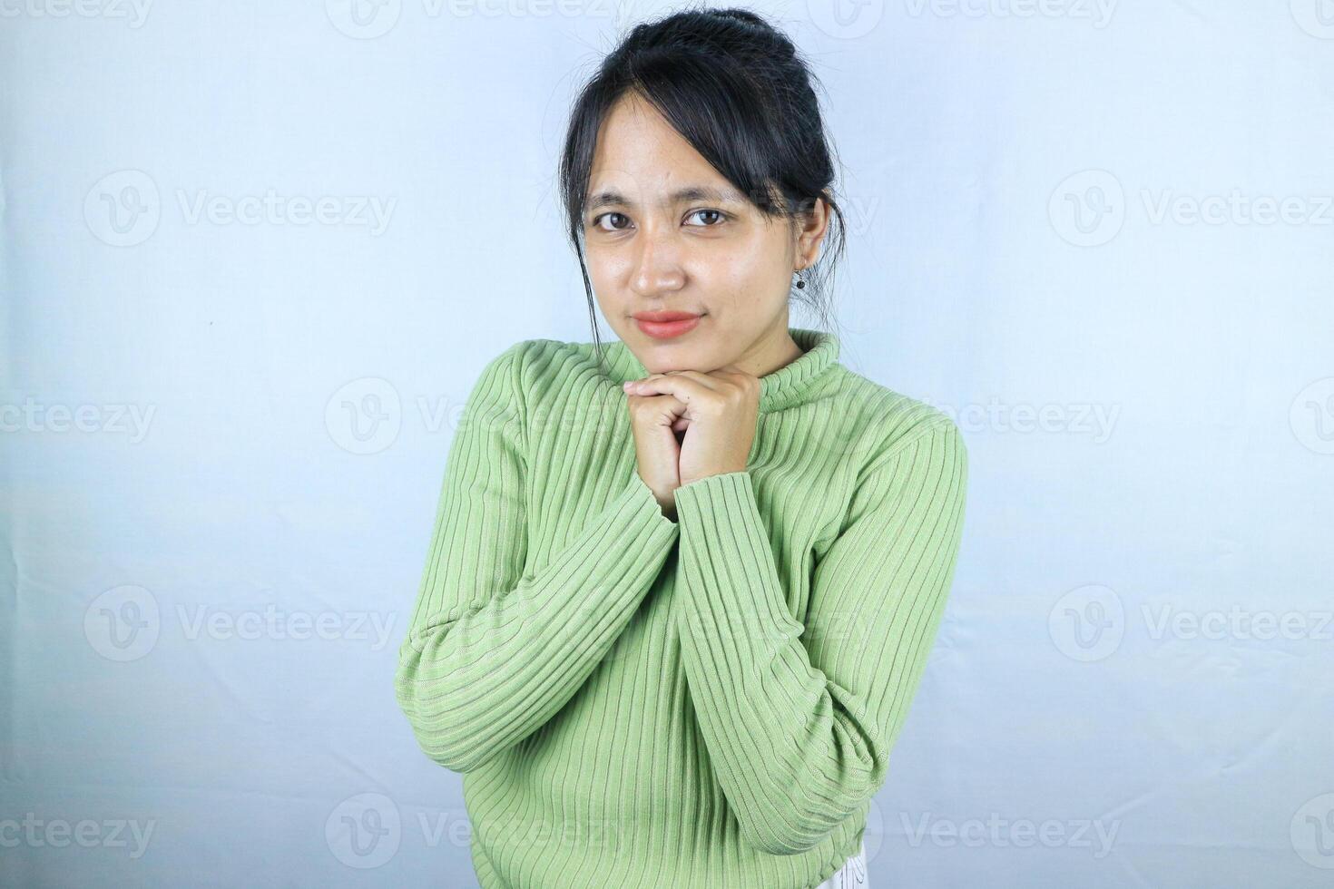Young asian woman standing pose thinking on isolated white background ...