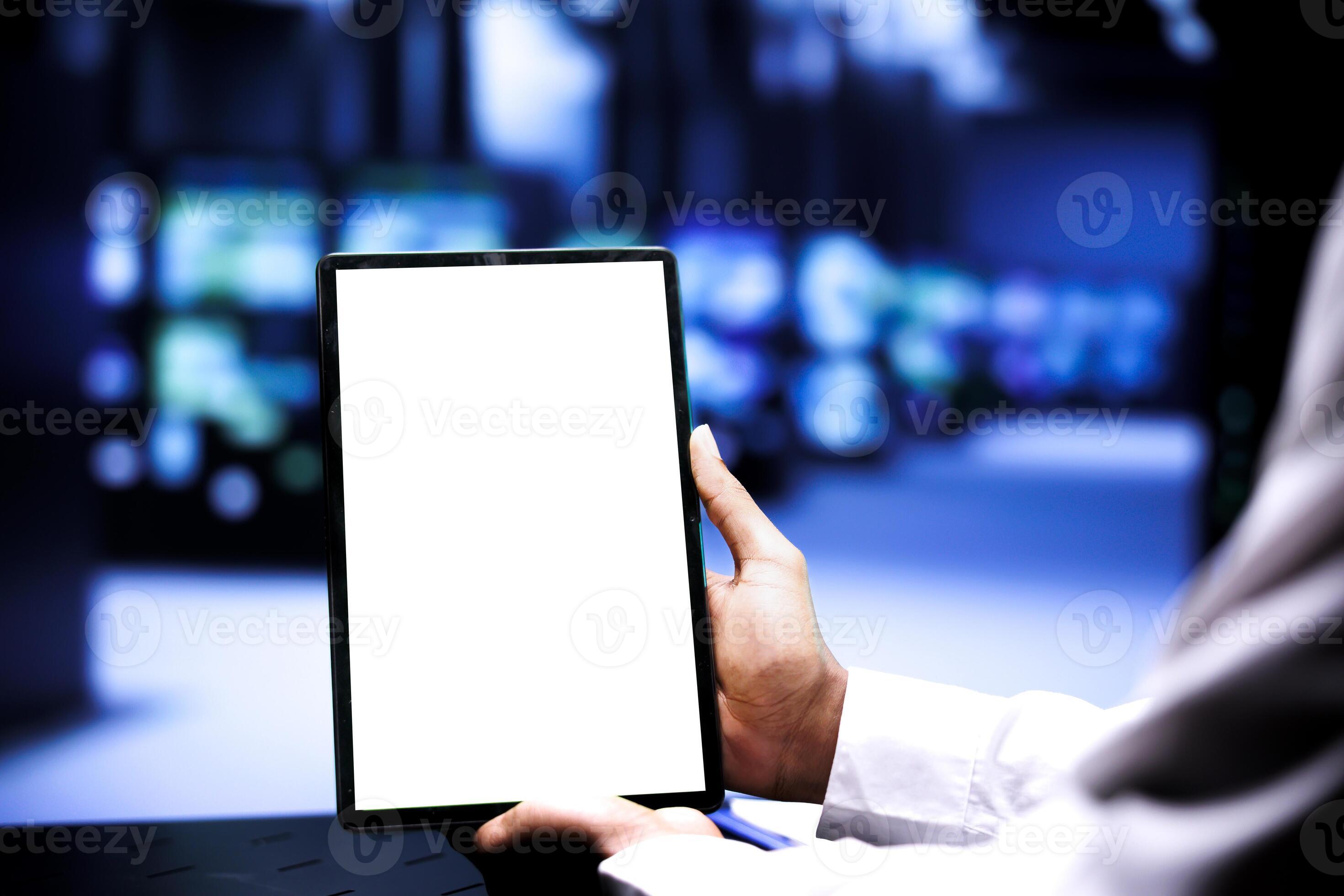 Serviceman Using Mock Up Tablet To Do Checkup On Servers Helping Businesses Host Websites And