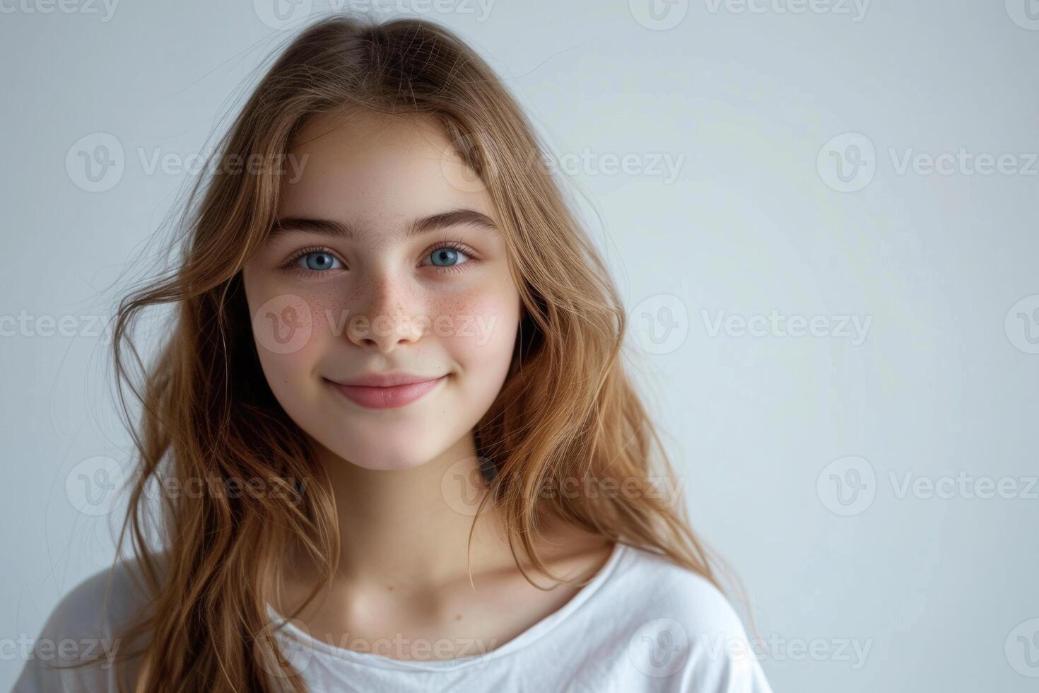 Portrait Of Young Beautiful Cute Cheerful Girl Smiling Looking At