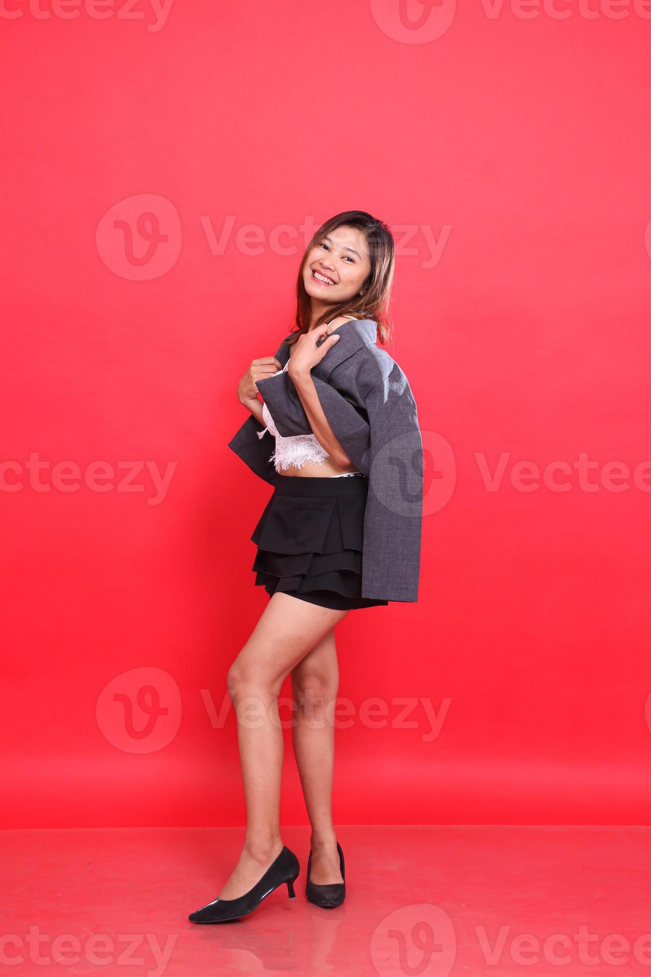 Full Body Asian Girl In A Gray Suit Sexy Cheerful Tilted To The Right Holding A Jacket Long