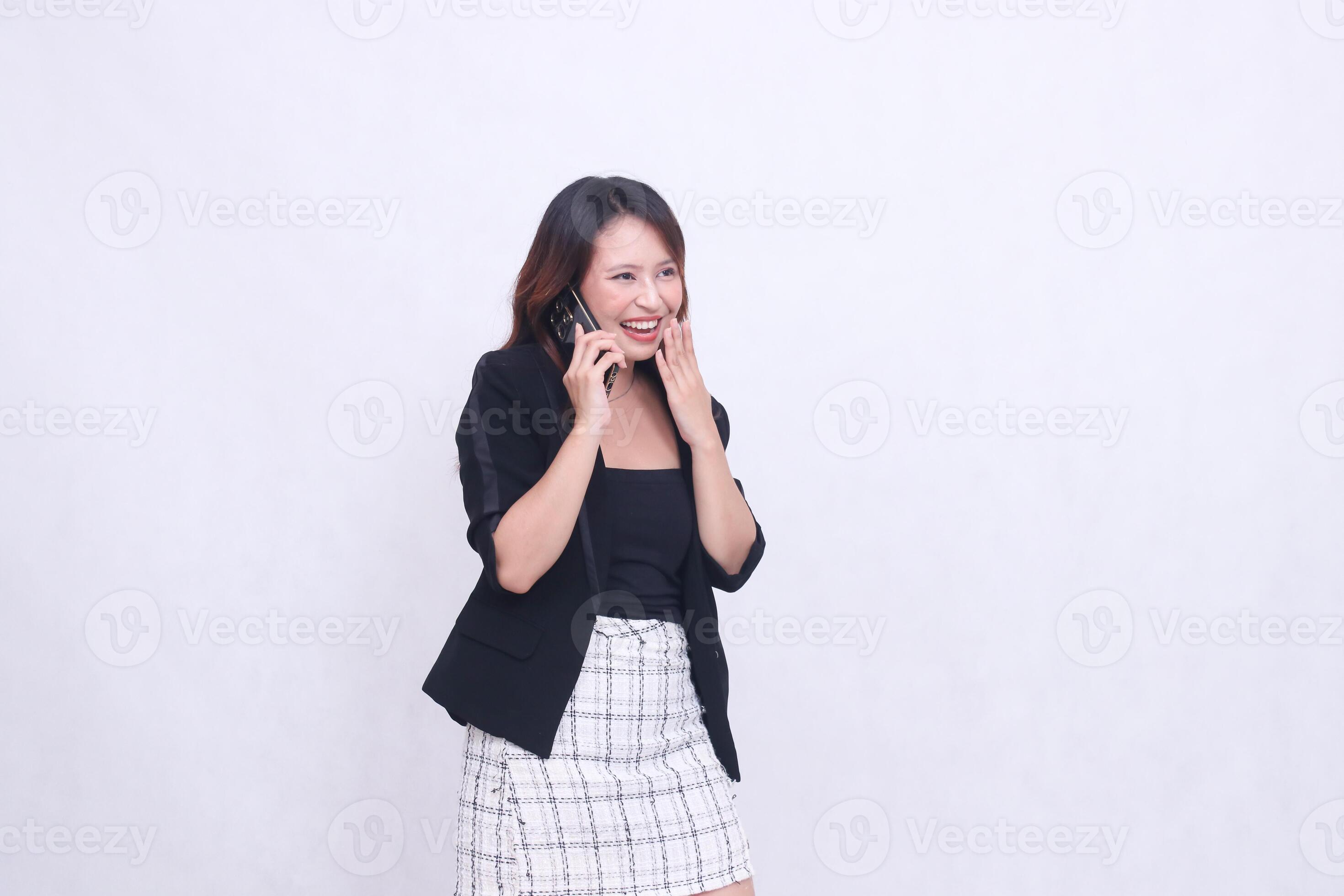 the charm of a beautiful Asian office woman in her 20s, laughing ...