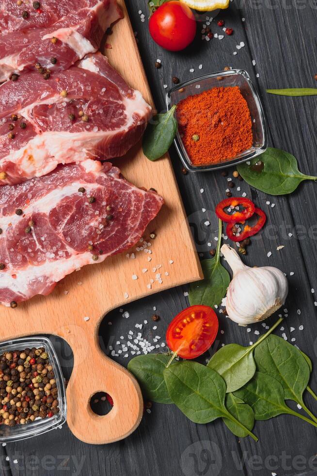 Raw Pork Chop Steak Prepare In Kitchen With Vegetable And Spices For Food And Cooking Concept