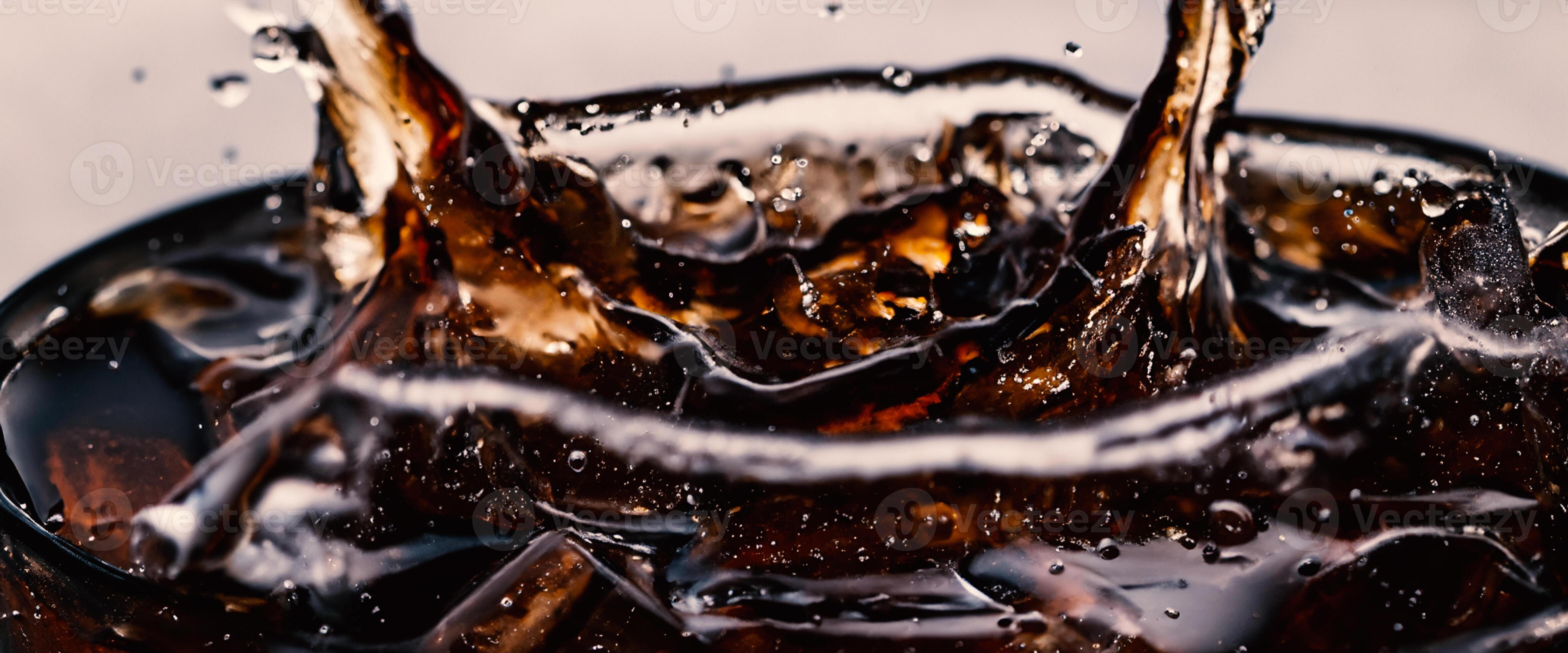Splashing of Cola and Ice. Cola soda and ice splashing fizzing or floating up to top of surface ...