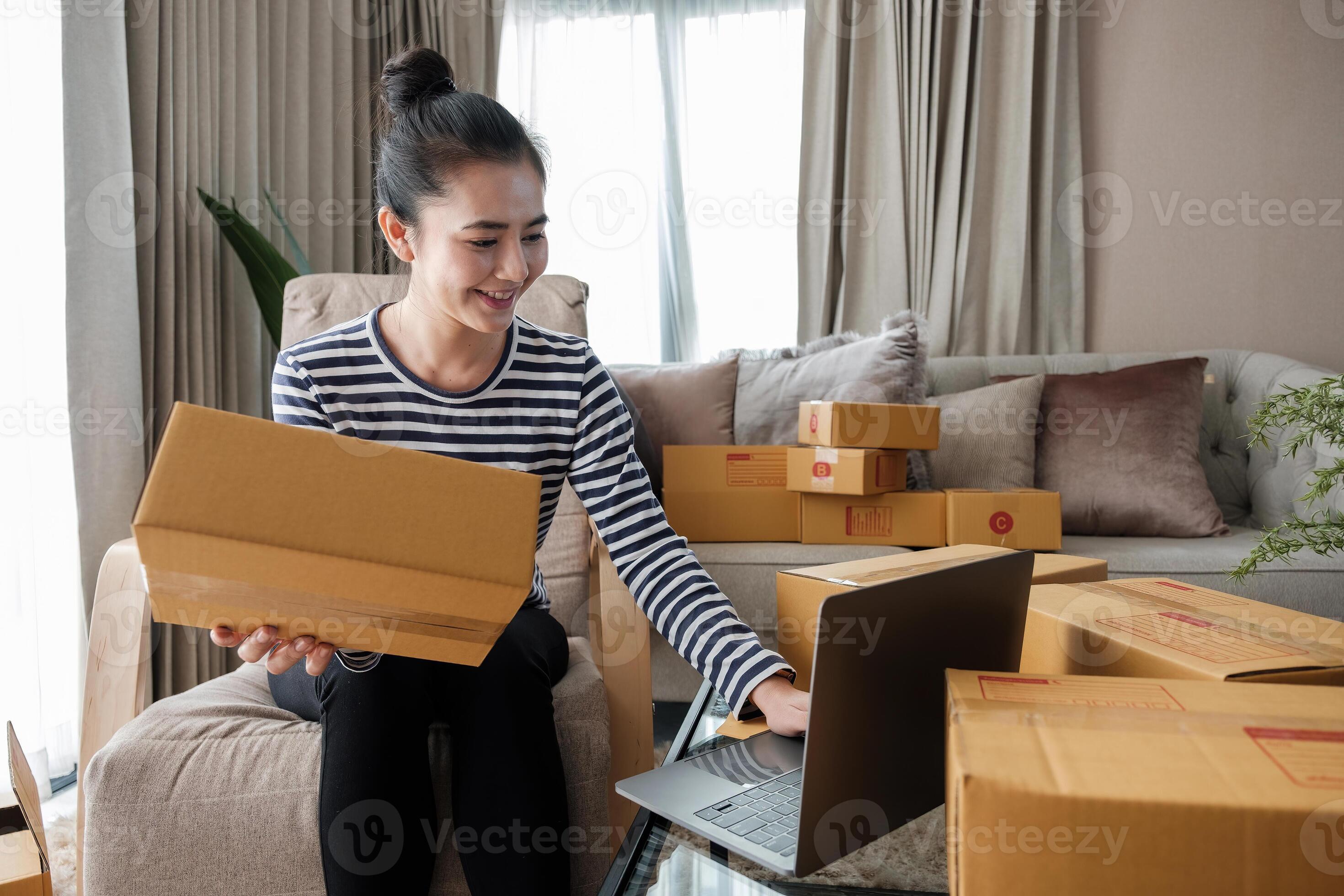 Business Start up SME concept. Young startup entrepreneur small business owner working at home ...