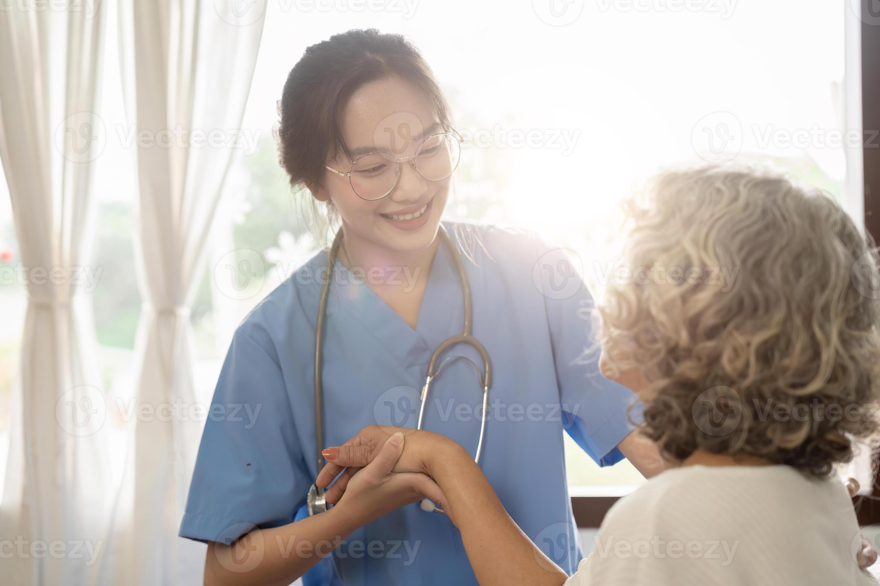 Young Caregiver Helping Senior Woman Nurse Assisting Her Old Woman