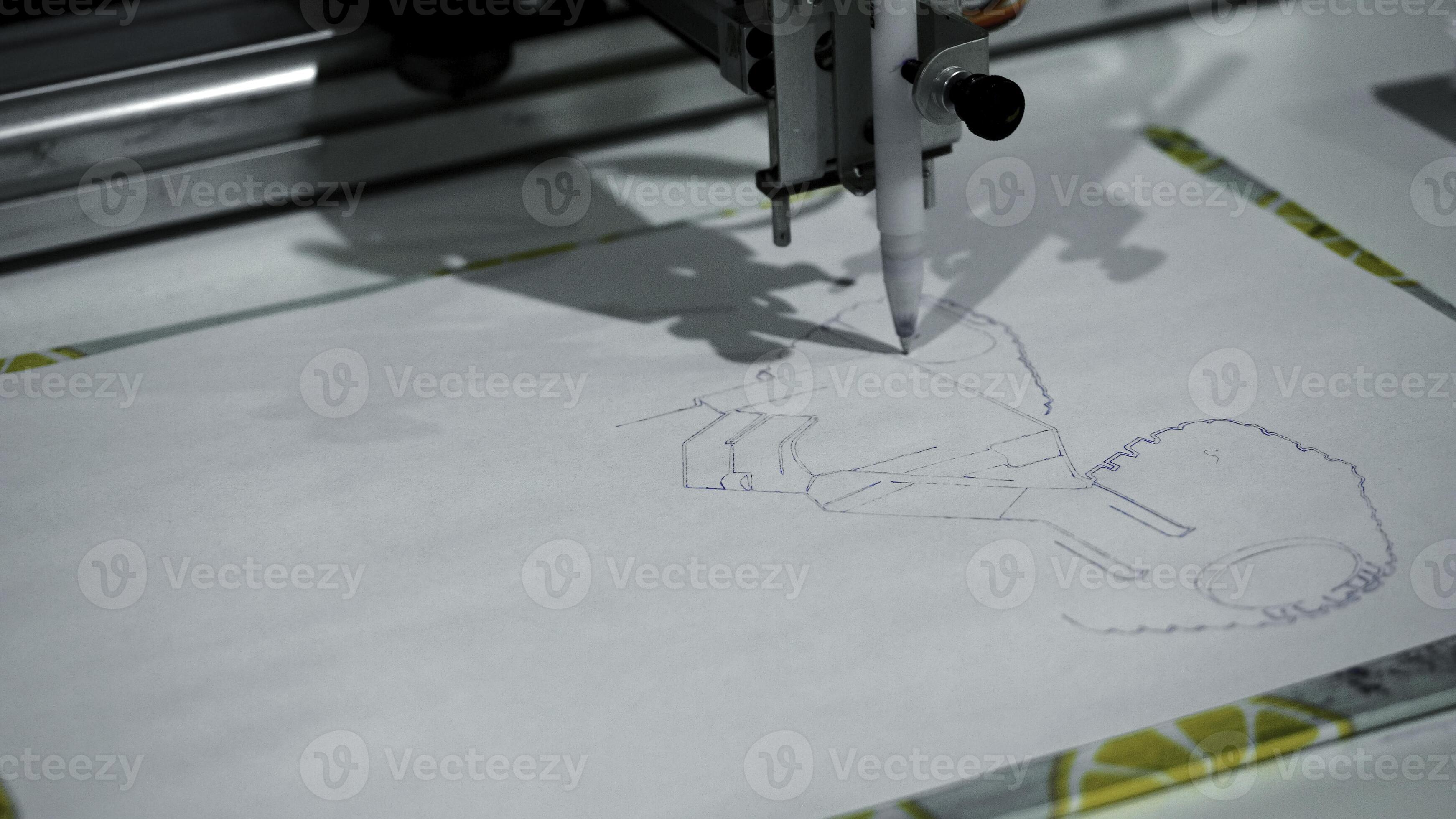 Automated machine draws image on paper. Media. Robotic machine that ...