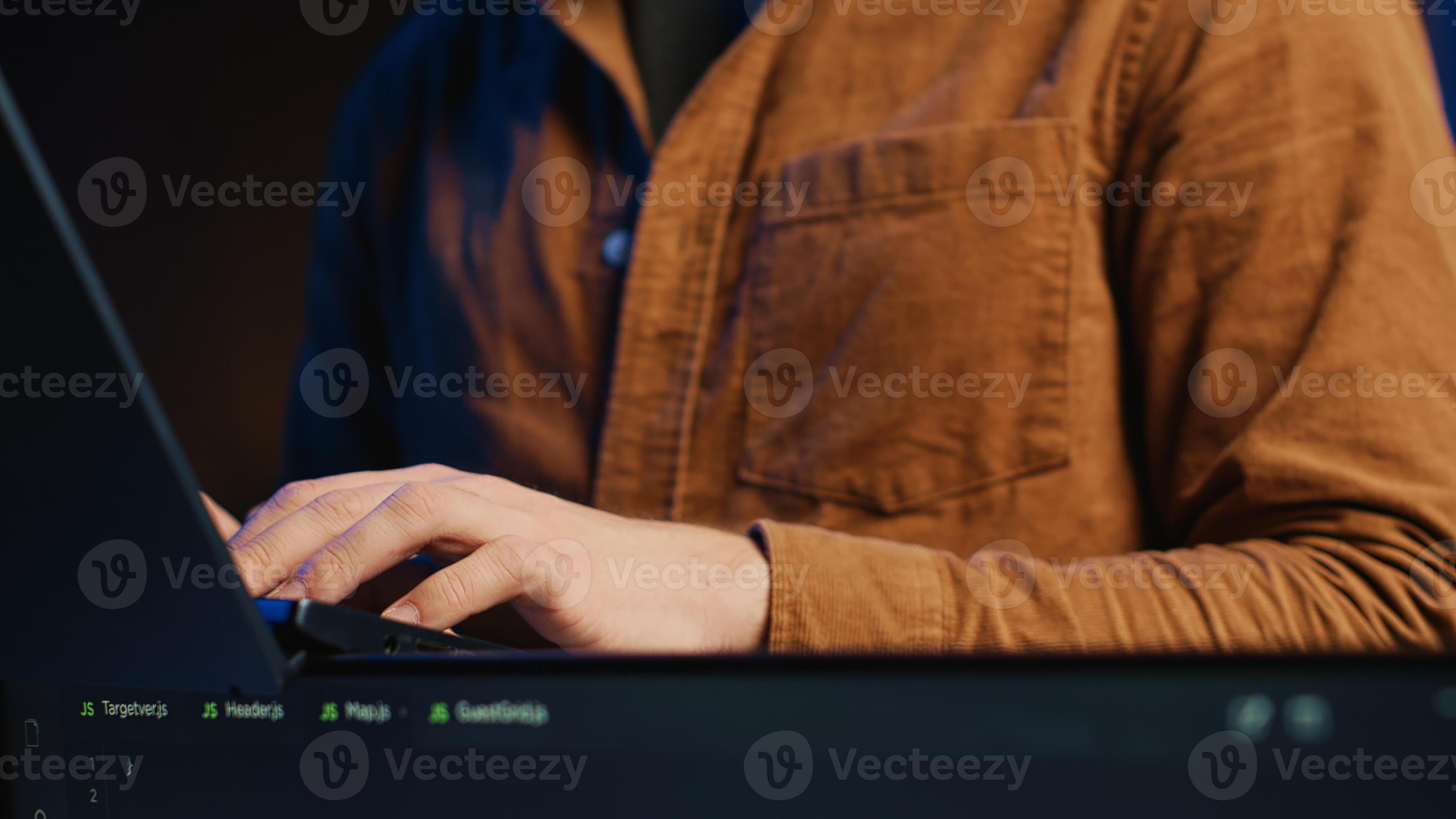 Programmer Concentrating On Writing Complex Binary Code Scripts On Laptop Terminal Close Up