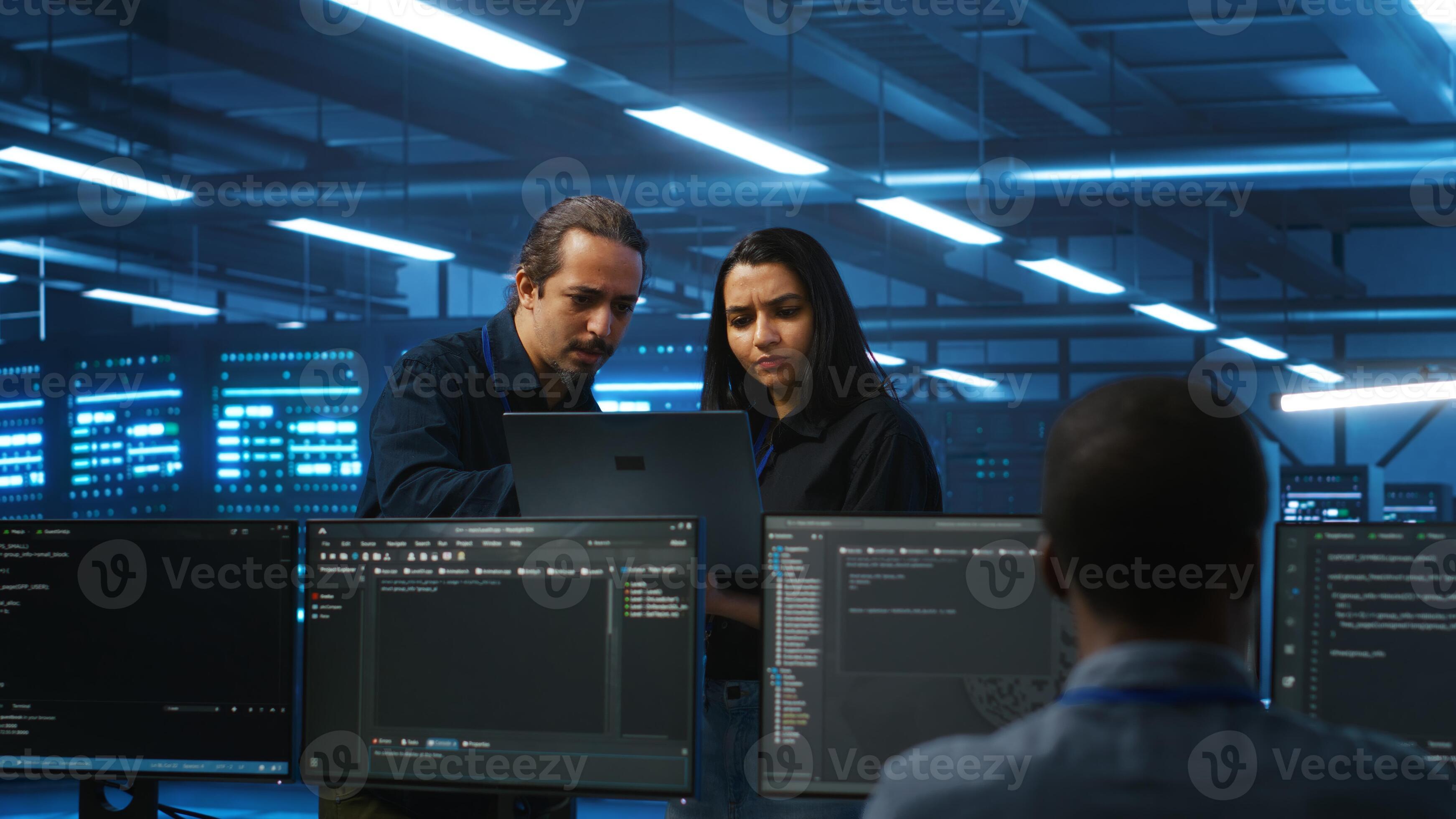Multiethnic Engineering Team In Server Hub Monitoring Data Center