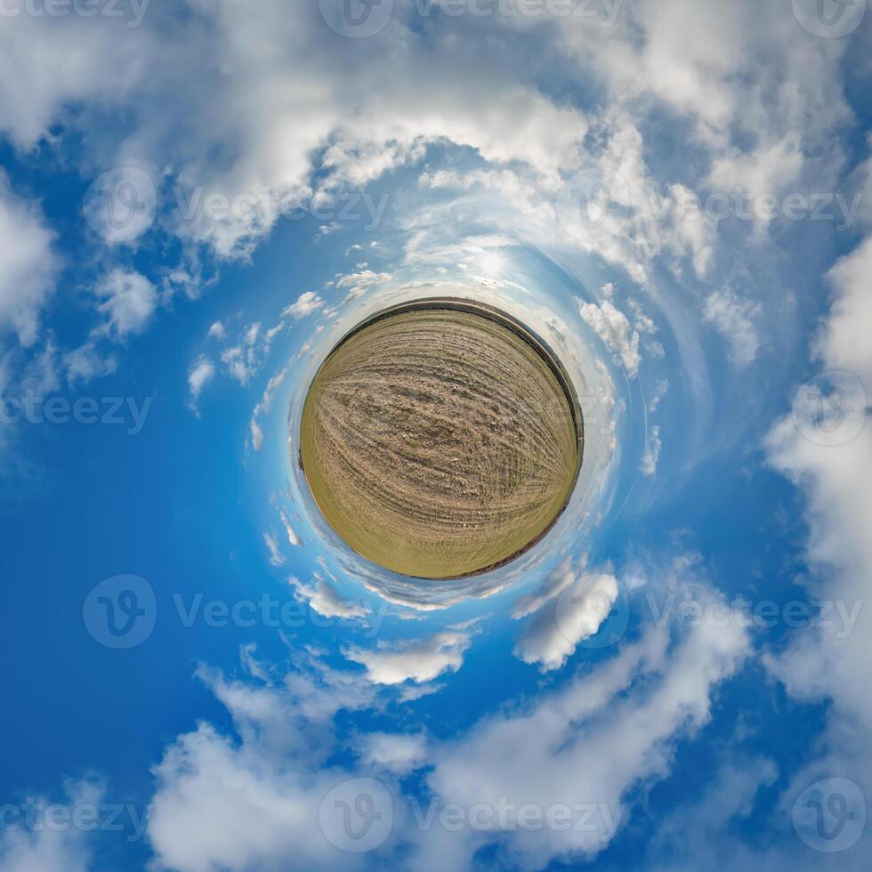 simple tiny planet without buildings in blue sky with beautiful clouds ...
