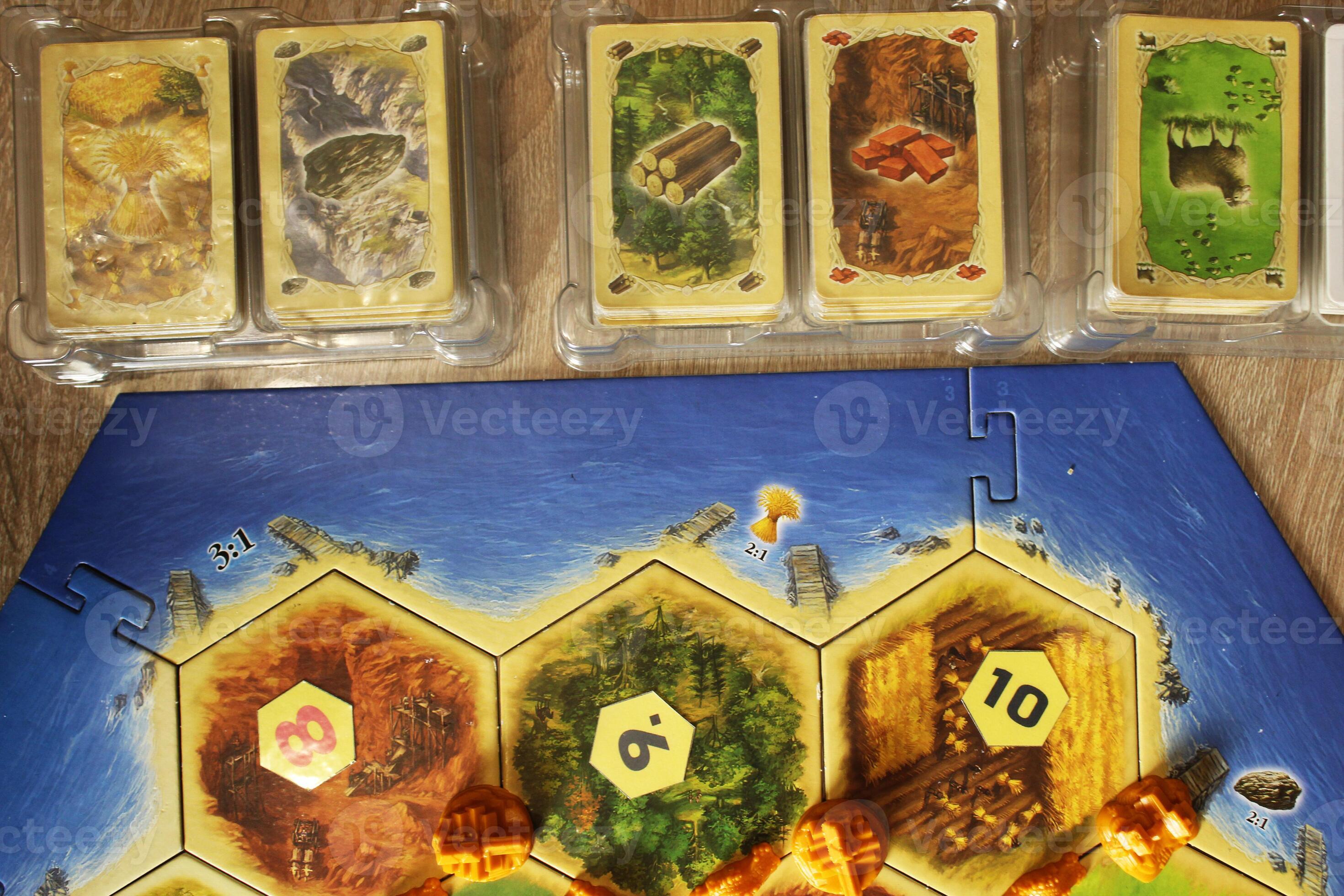 Mozyr, Belarus, April 01 2024. A catan board game map layout before the ... Mozyr, Belarus, April 01 2024. A catan board game map layout before the ...