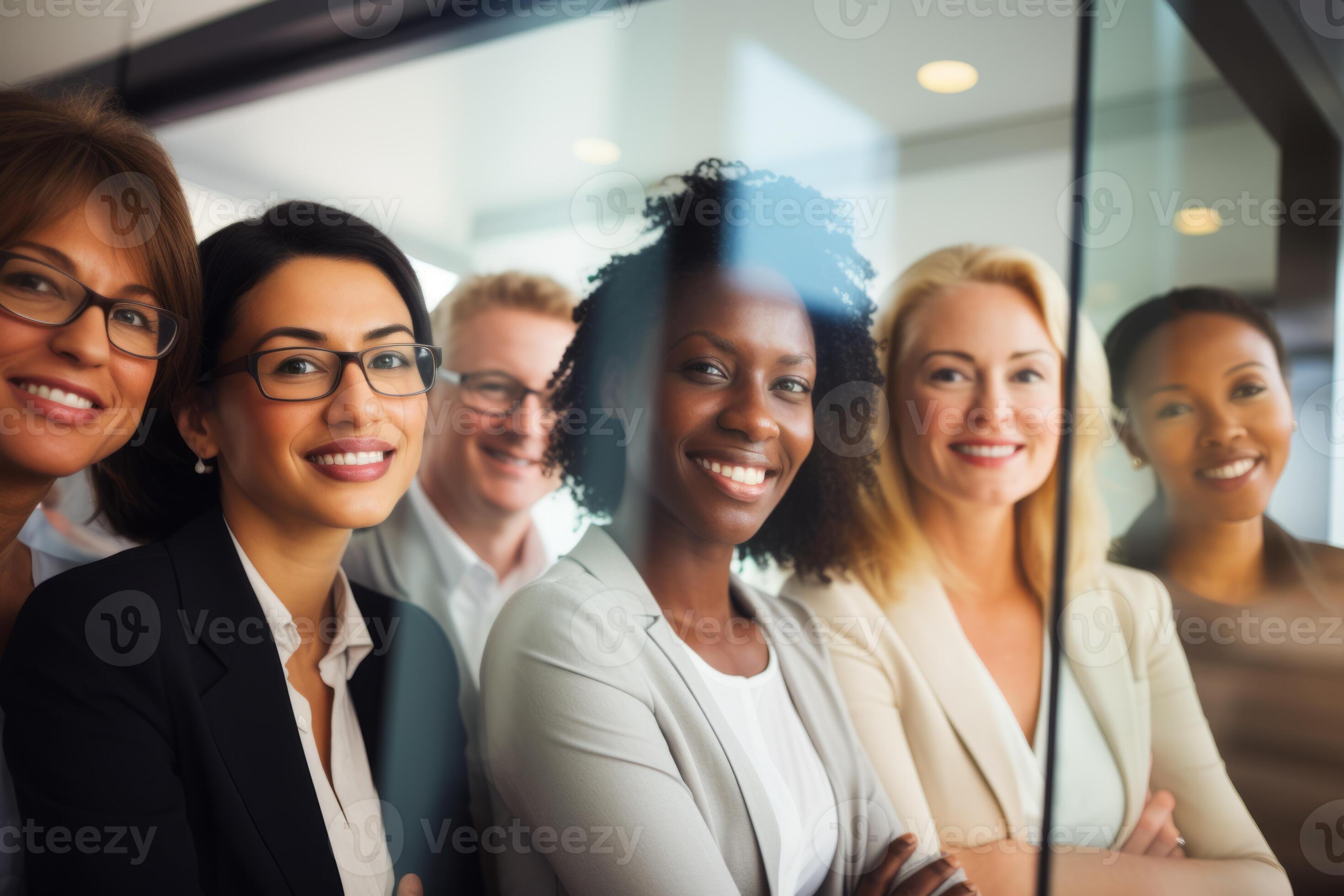 Diverse team posing in front of office building company advertising ad marketing hr employees ...