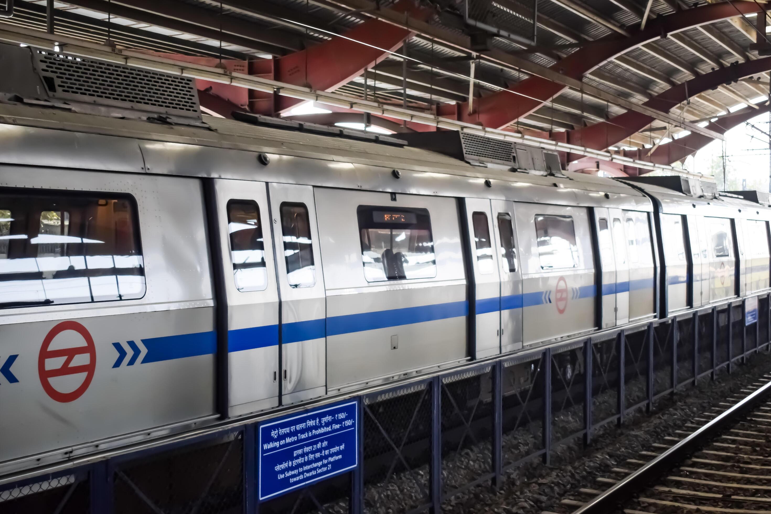 New Delhi, India, June 10 2024 - Delhi Metro train arriving at Jhandewalan metro station in New ...