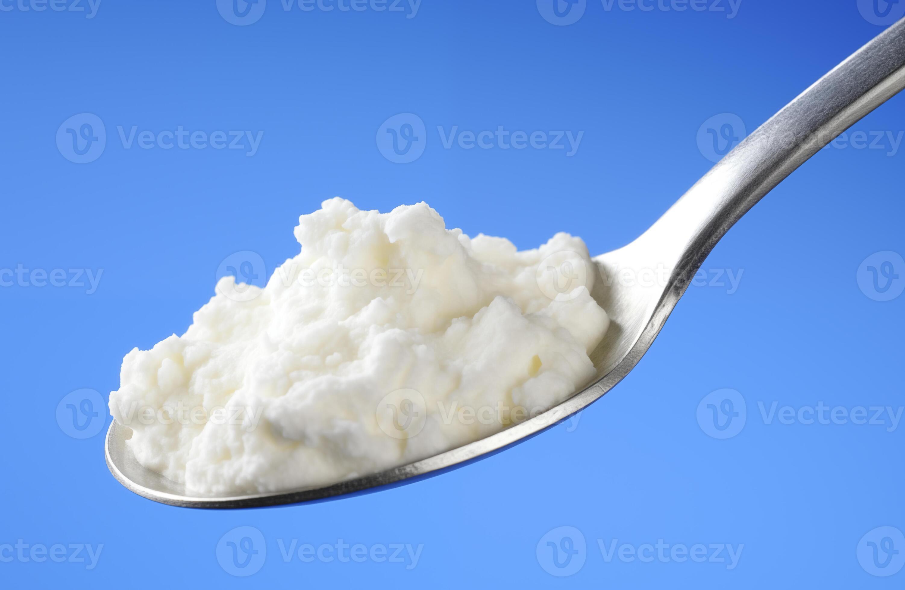 Fresh curdled milk, homemade sour yogurt in spoon 46626191 Stock Photo at Vecteezy