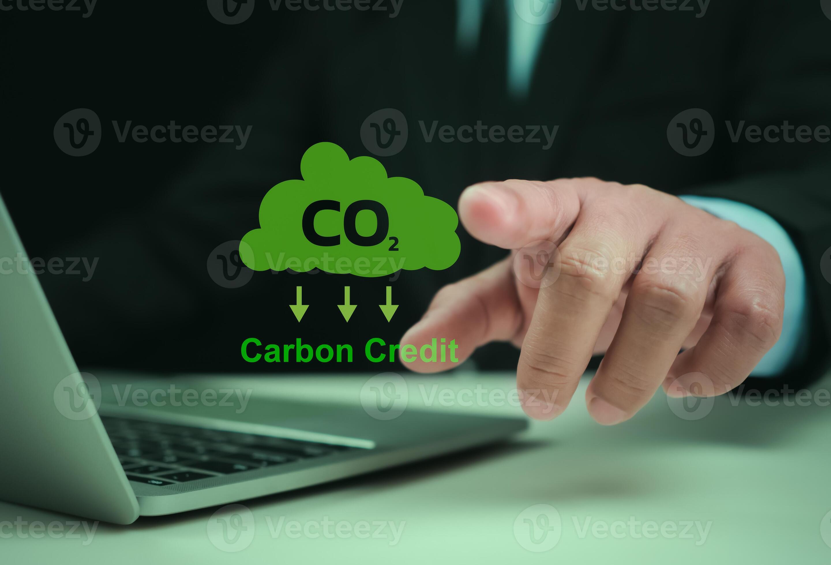 Carbon credit market concept. Businessman uses technology to exchange carbon credits, Carbon etf ...