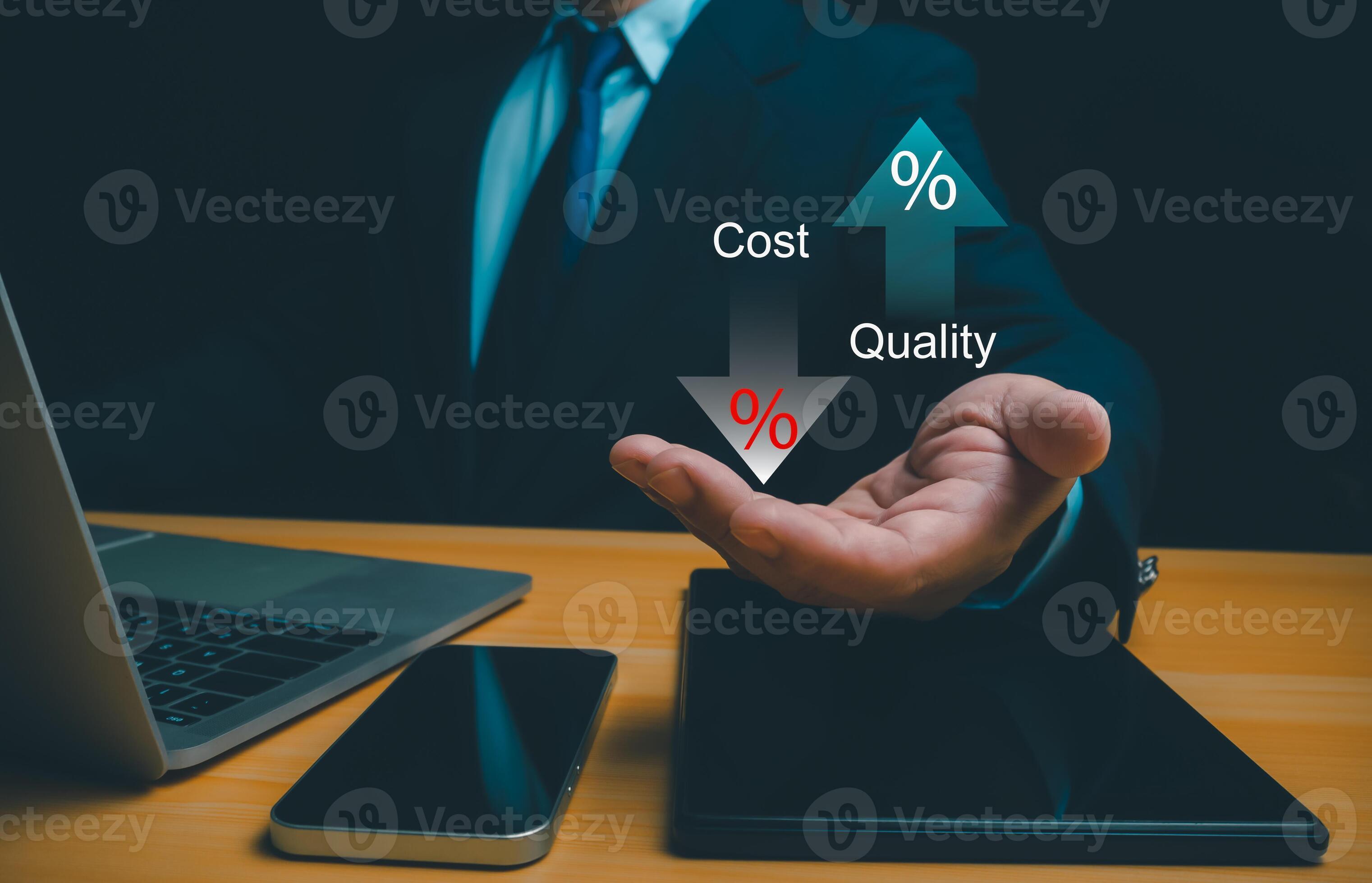 Businessman working on digital tablet computer with quality control growth graph and cost ...