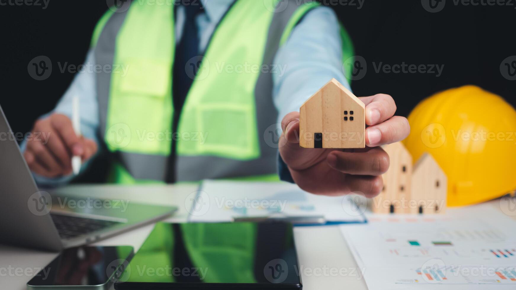 Architect Or Engineer Using Tablet To Work On Table Construction Planning Structural