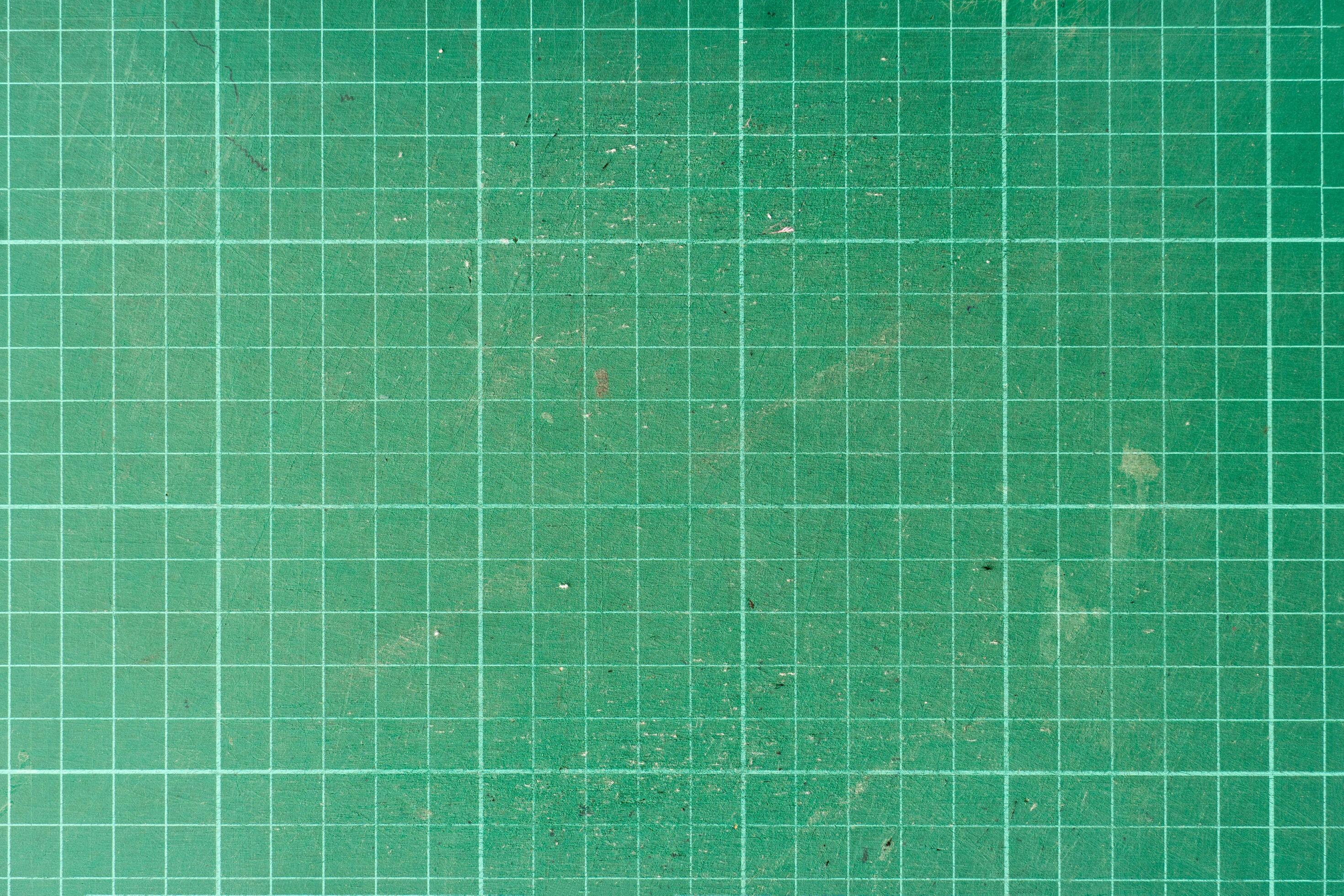 Background and textured of cutting mat green color. Used paper cutting ...