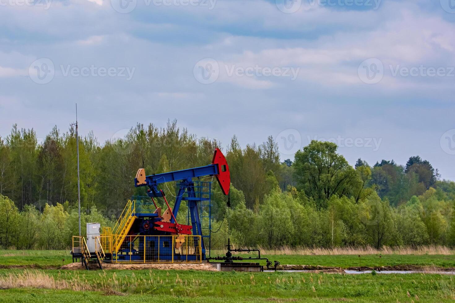 Oil drilling derrick pumps oil from ground. Petroleum industry, crude ... Oil drilling derrick pumps oil from ground. Petroleum industry, crude ...