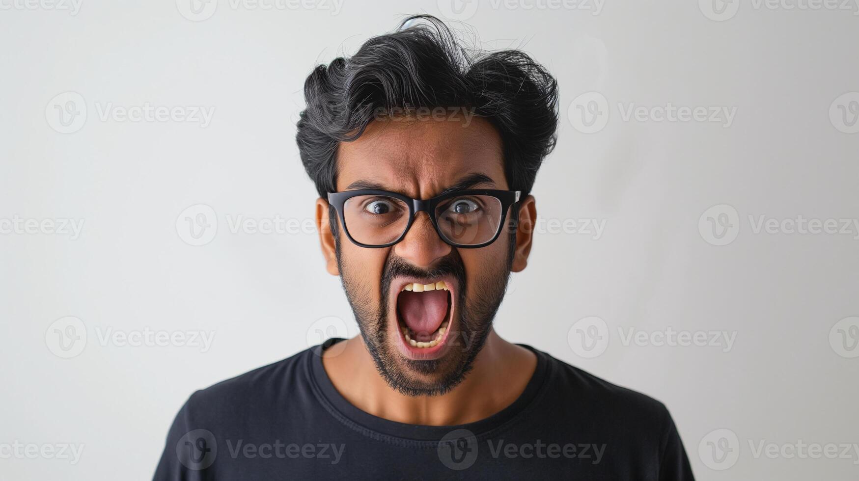 South Asian Man in Glasses Shouting in Anger with Intense Facial ...