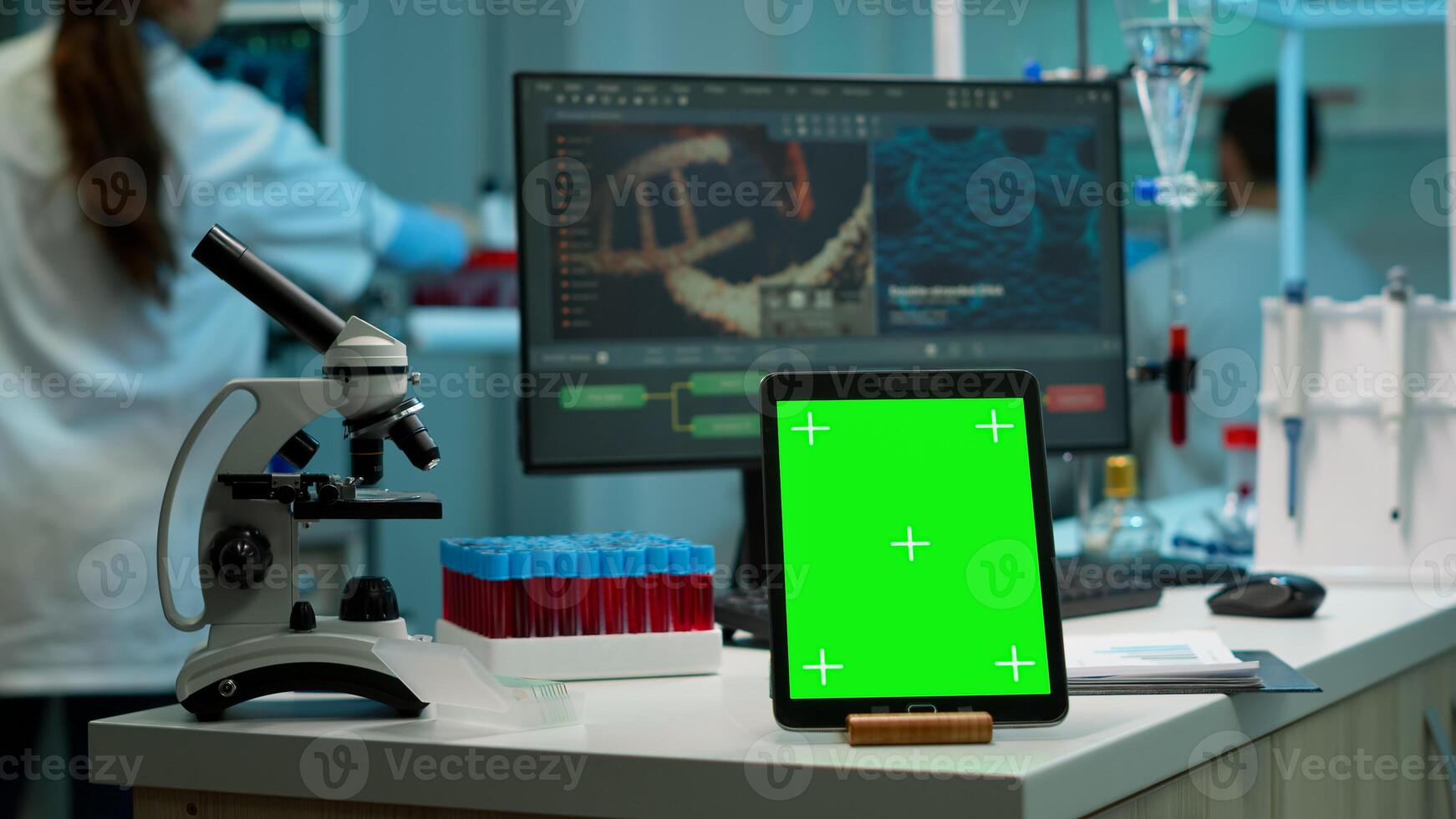 Scientist Standing At Monitor In Background Analysing Virus Evolution