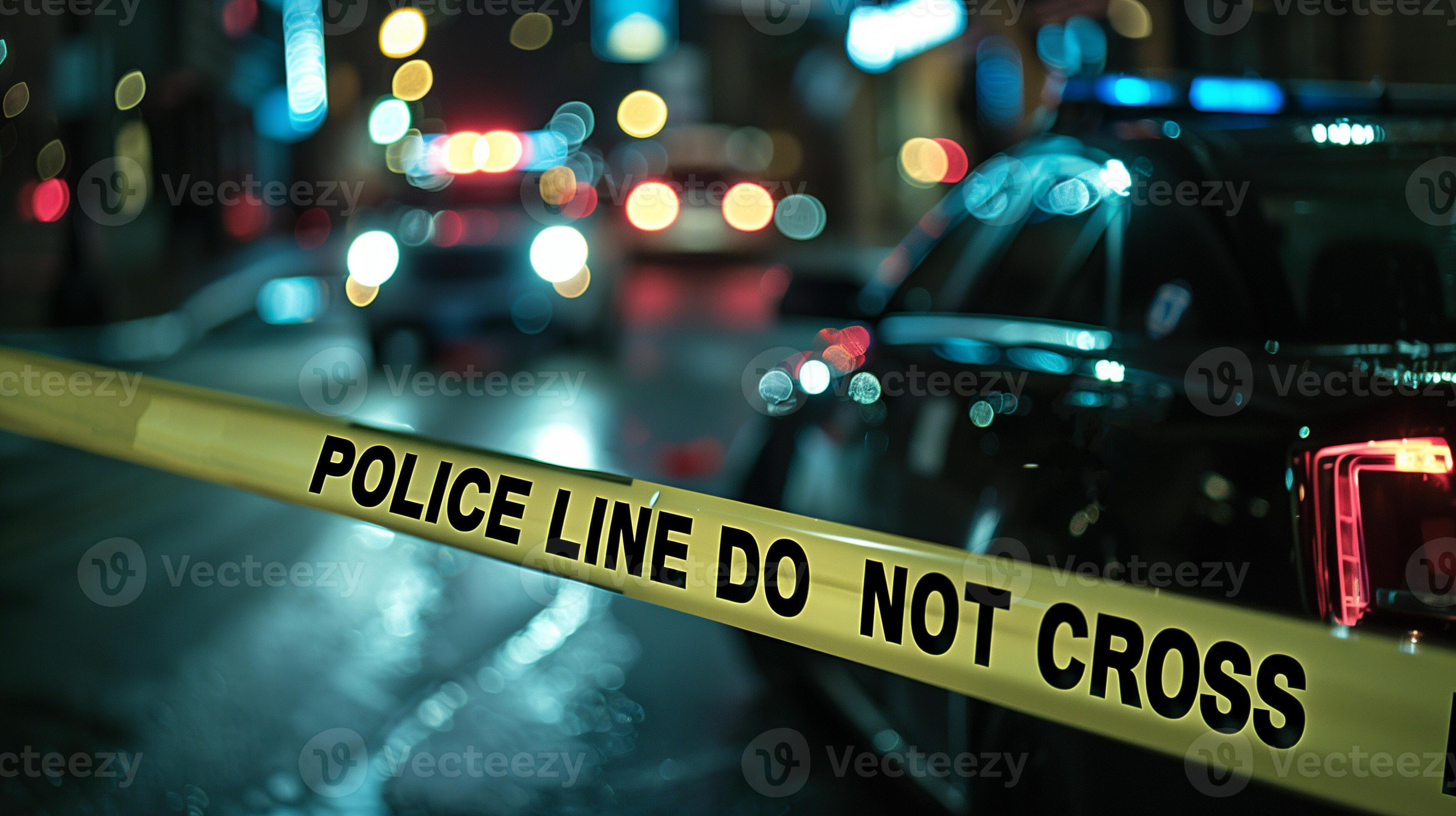 Crime scene concept. Police line do not cross yellow tape with police cars on the background ...