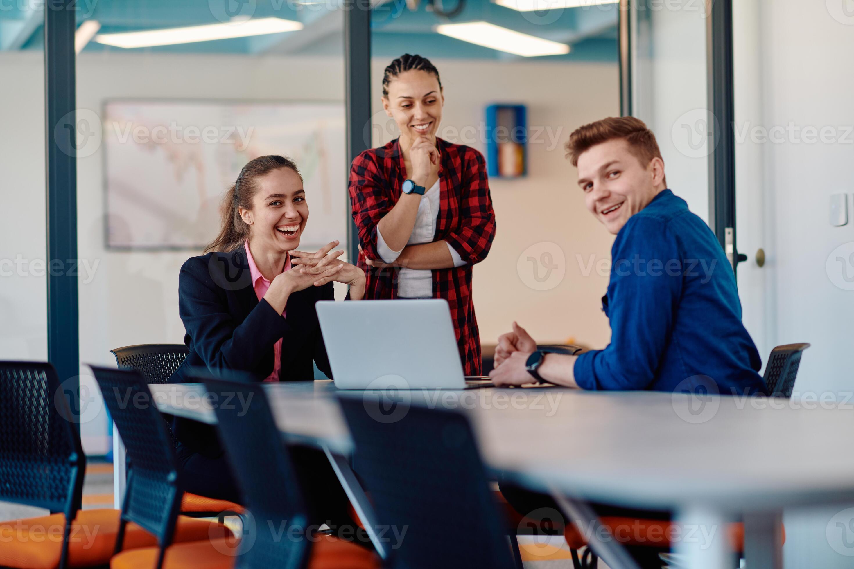 A Team Of Successful Programmers Sits In A Startup Office Strategizing New Business Projects