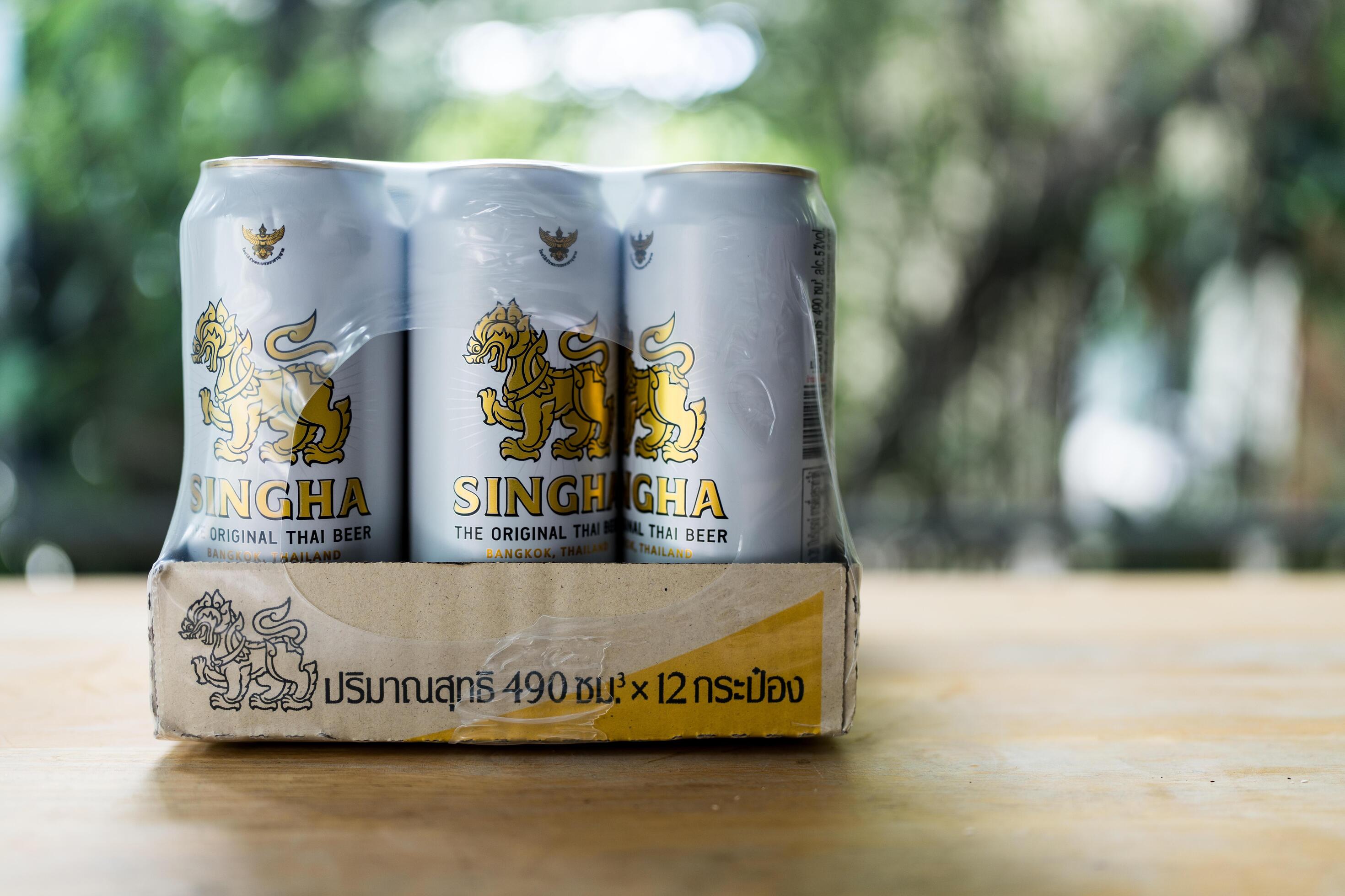 Bangkok, Thailand - June 23, 2024 A packs 12 Singha beer long can 490ml. Preparing for the party ...