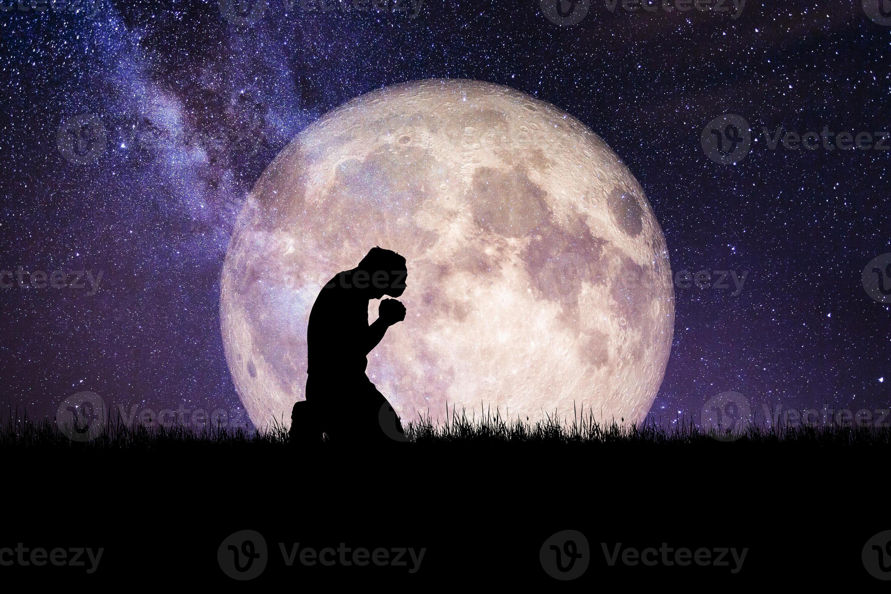 Silhouette of Person Kneeling in Prayer Against a Full Moon and Starry Night Sky 46928794 Stock ...