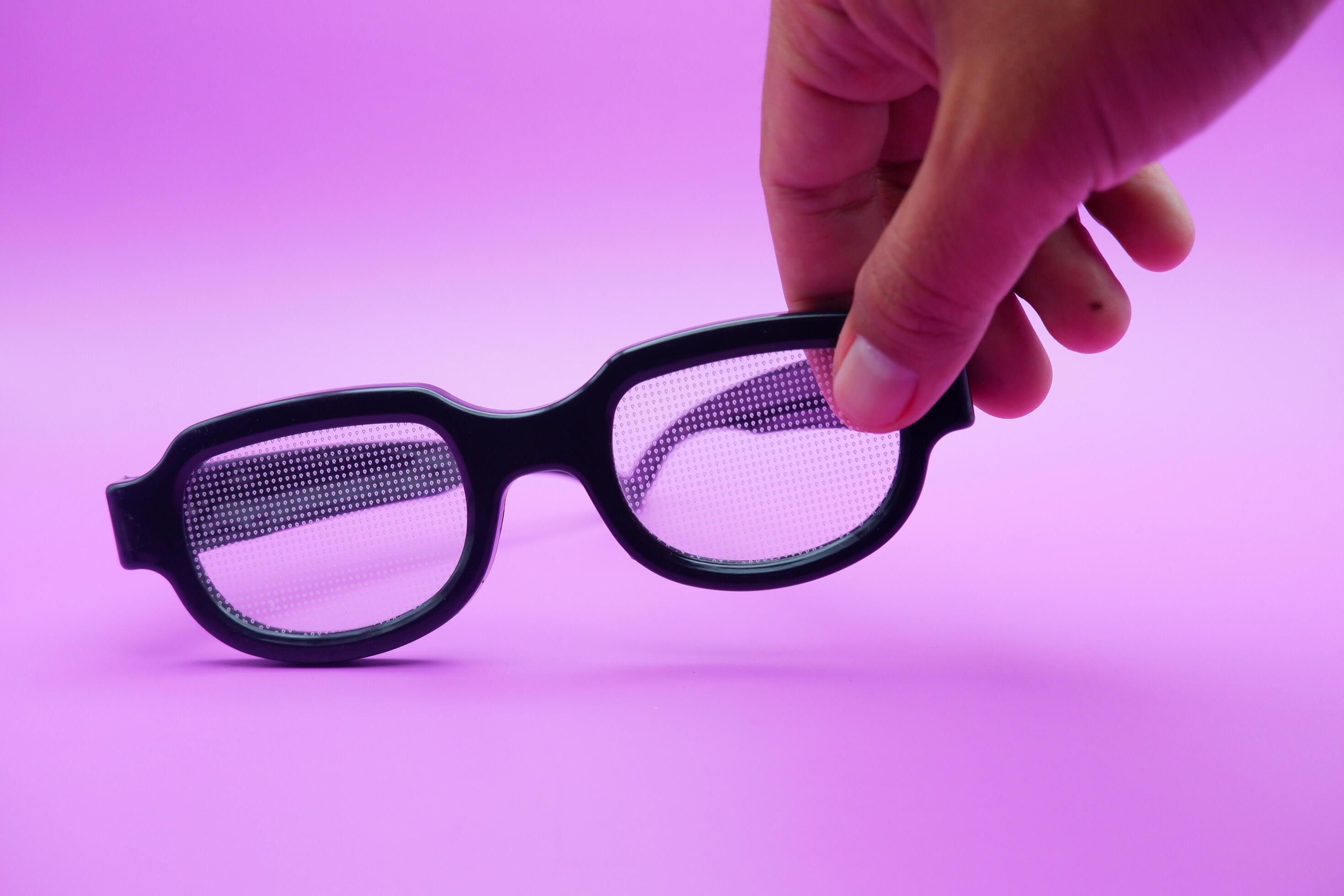 Hand Holding Black Frame Glasses Black Frame Glasses Isolated On Purple Background Black Frame