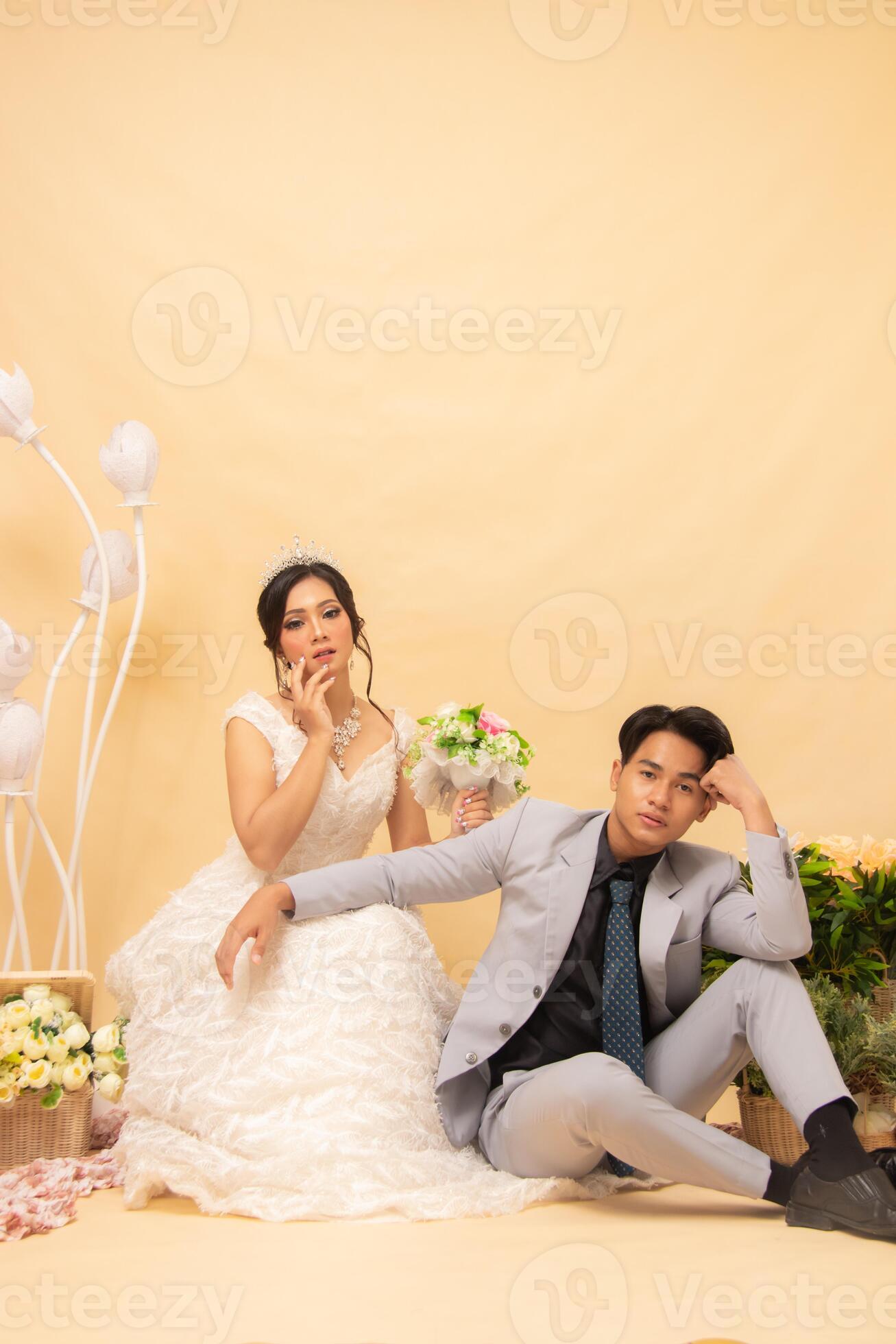 Expressions Of Male And Female Couples Sitting Relaxed Smiling At Each