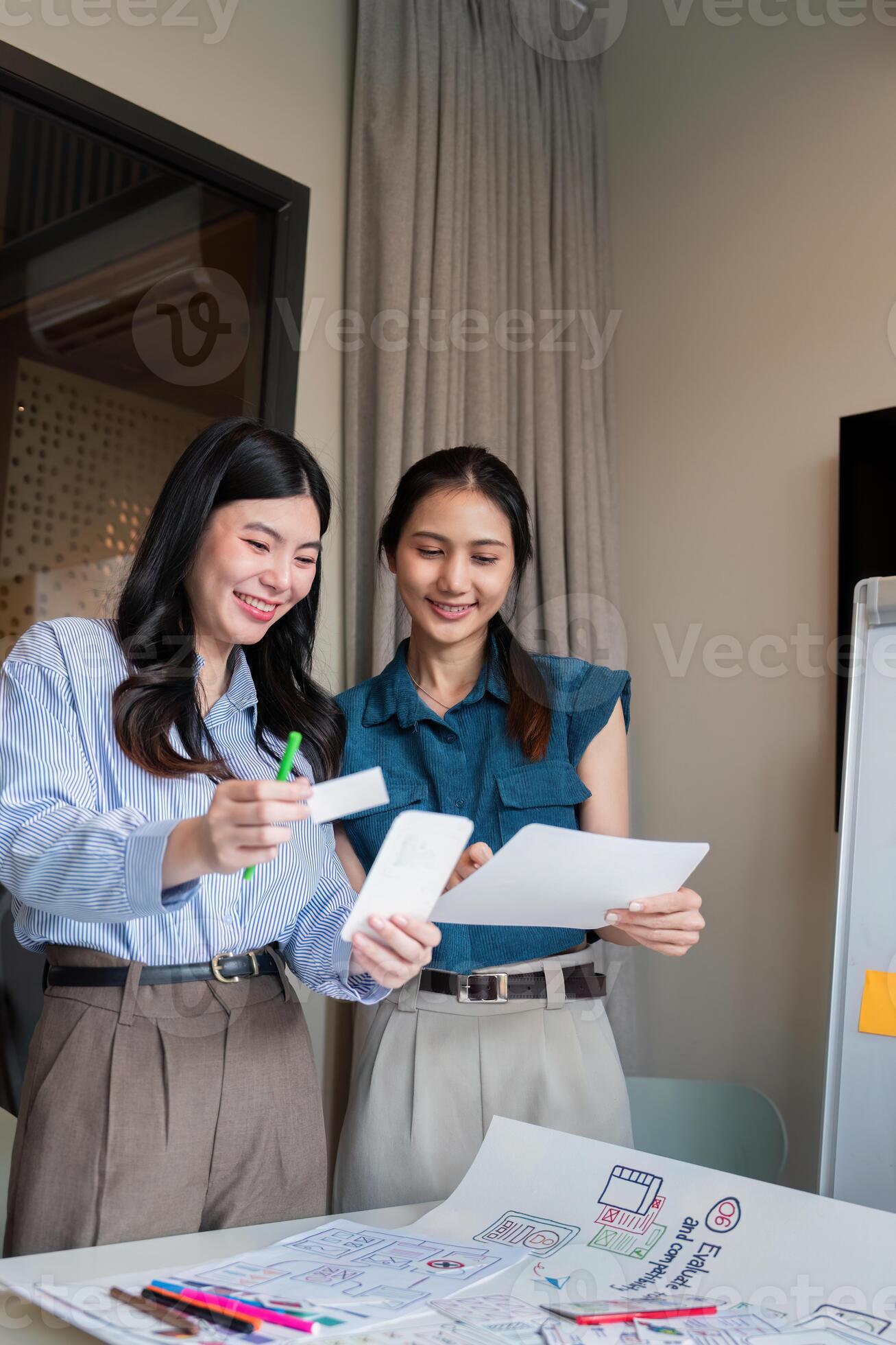 Ux Developer And Ui Designer Presenting Mobile App Interface Design On