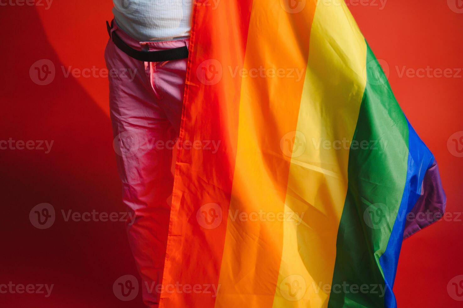 Happy Gay Man Having Fun Holding Rainbow Flag Symbol Of Lgbtq Community