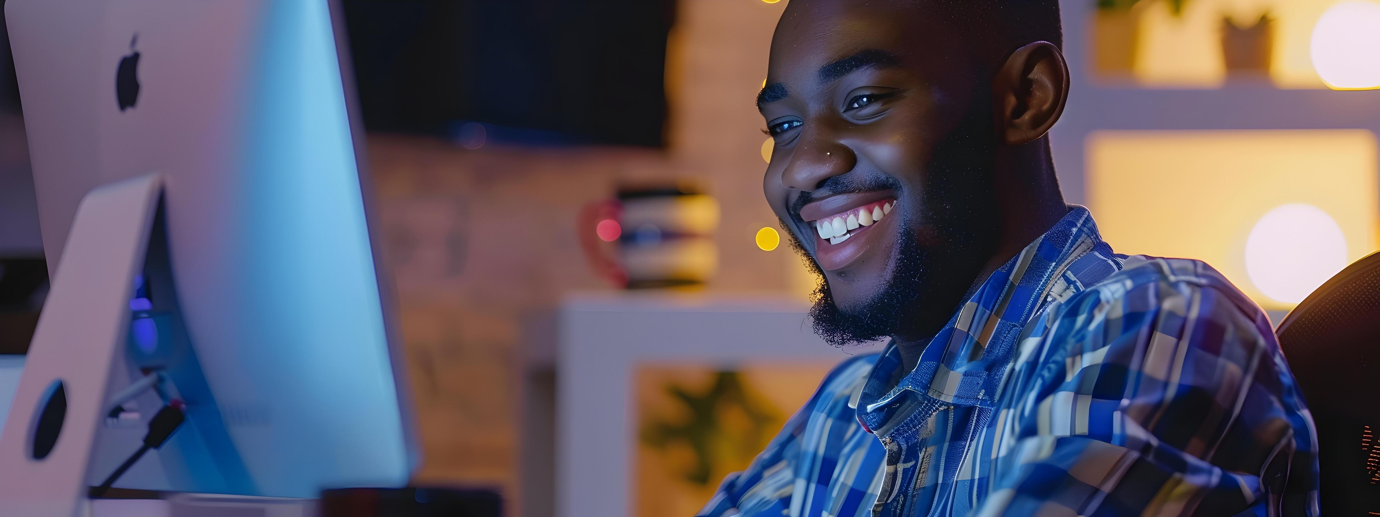 Happy African American Software Developer Coding at Workstation ... Happy African American Software Developer Coding at Workstation ...