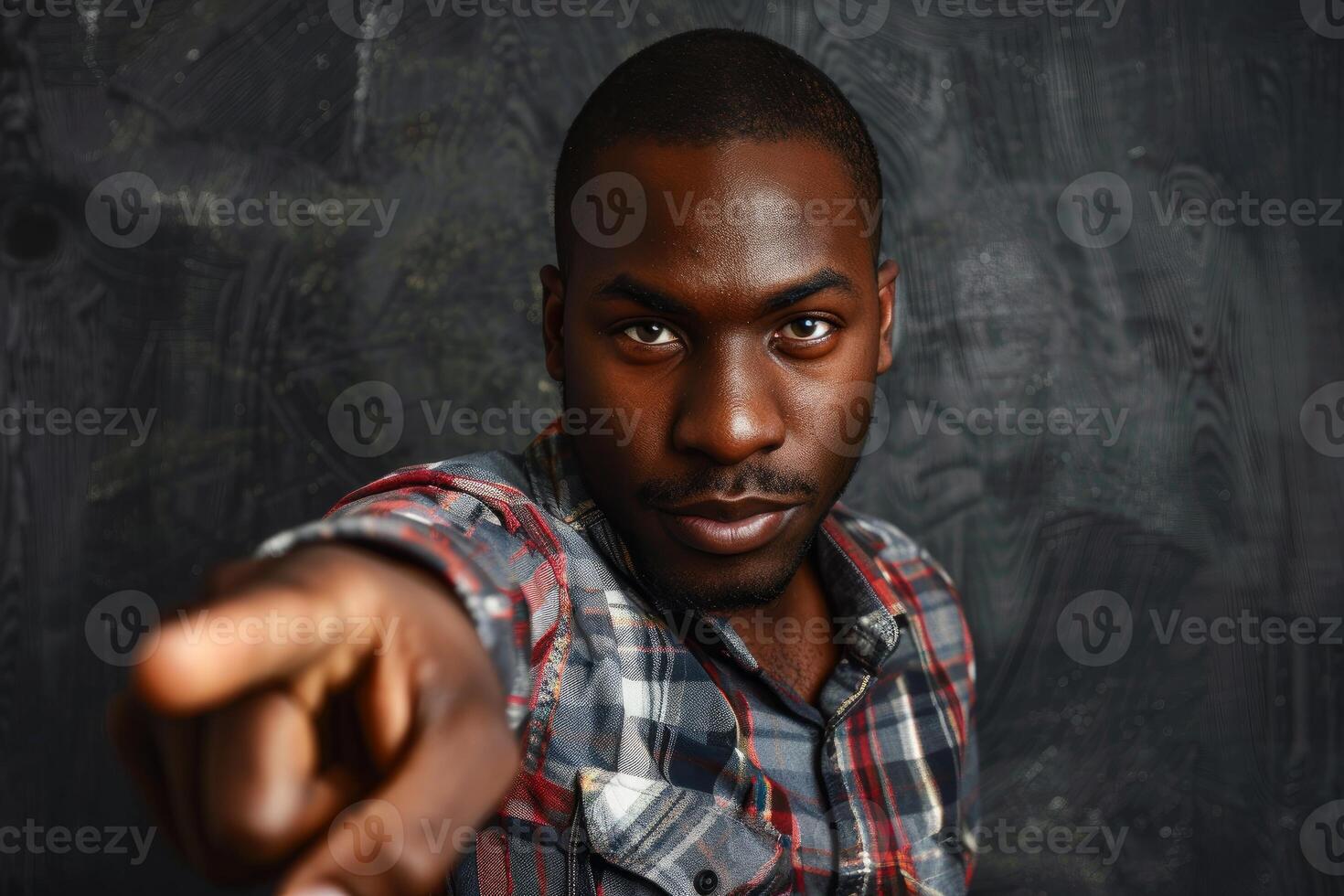 Confident man pointing towards camera 47323637 Stock Photo at Vecteezy