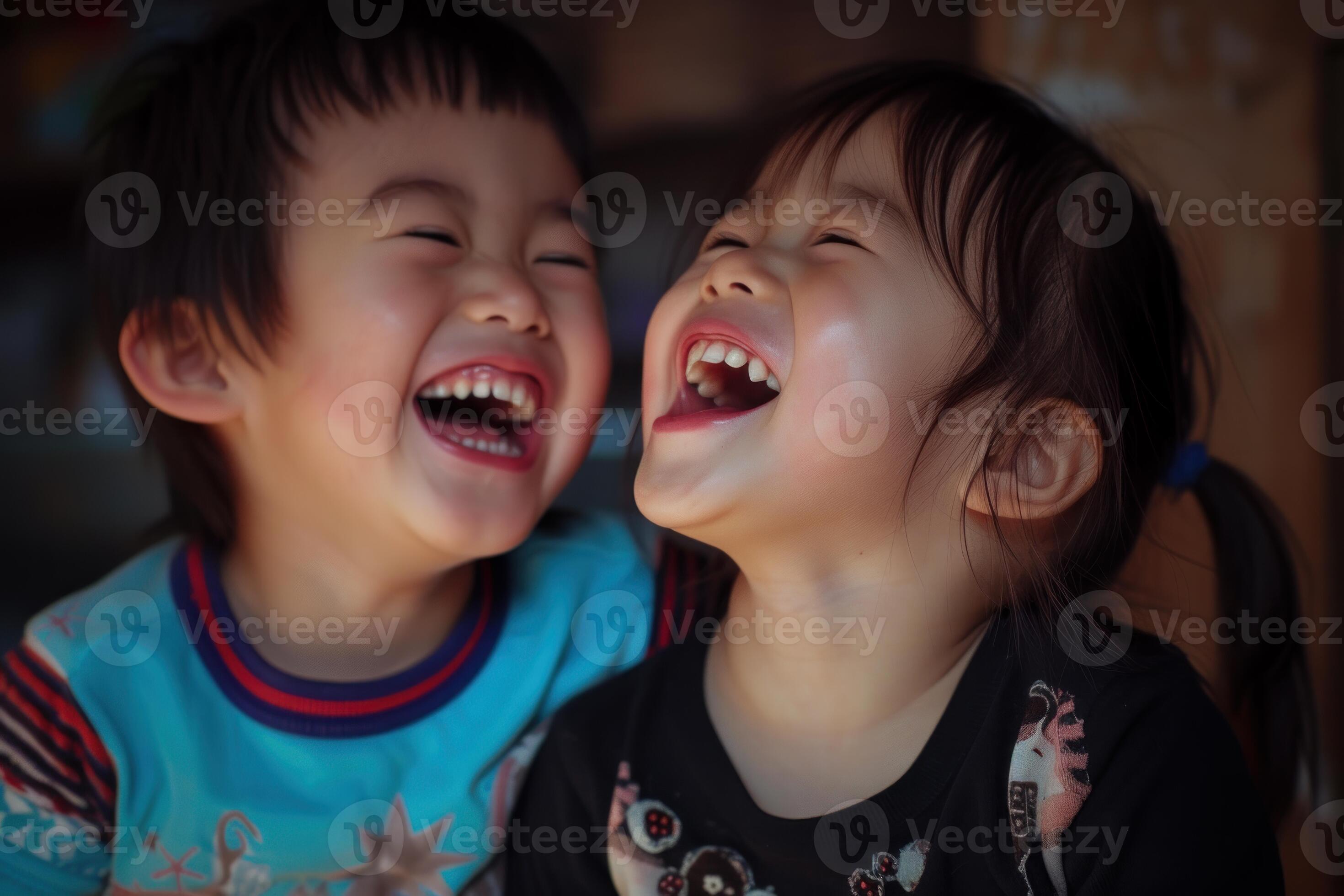Joyful siblings sharing a laugh together 47333804 Stock Photo at Vecteezy