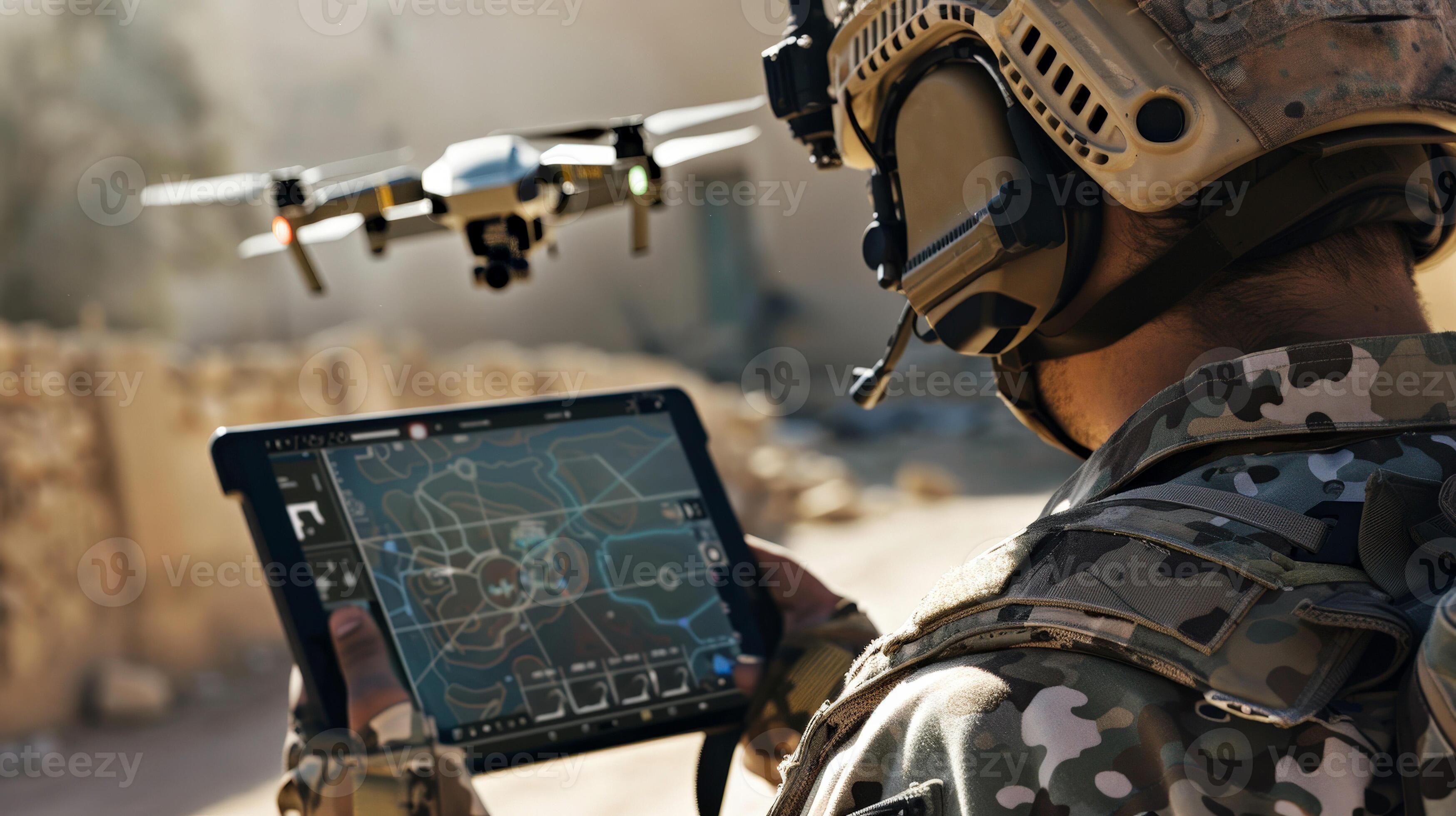 A soldier hold tablet in the field, operating drones. . A drone controller and camera visuals on ...