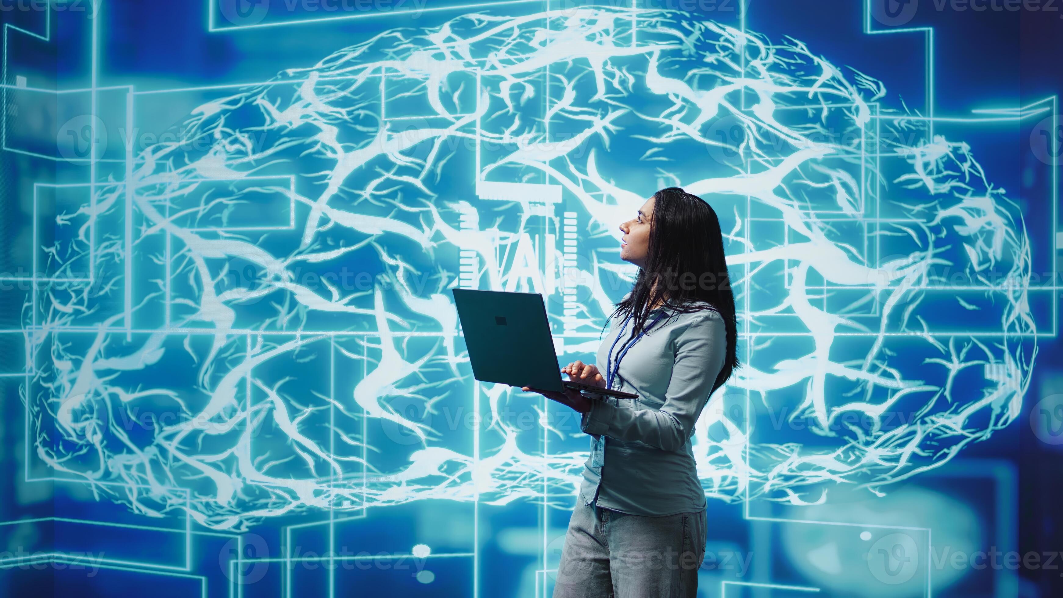 Technician using laptop to maintenance artificial intelligence neural networks made up of ...