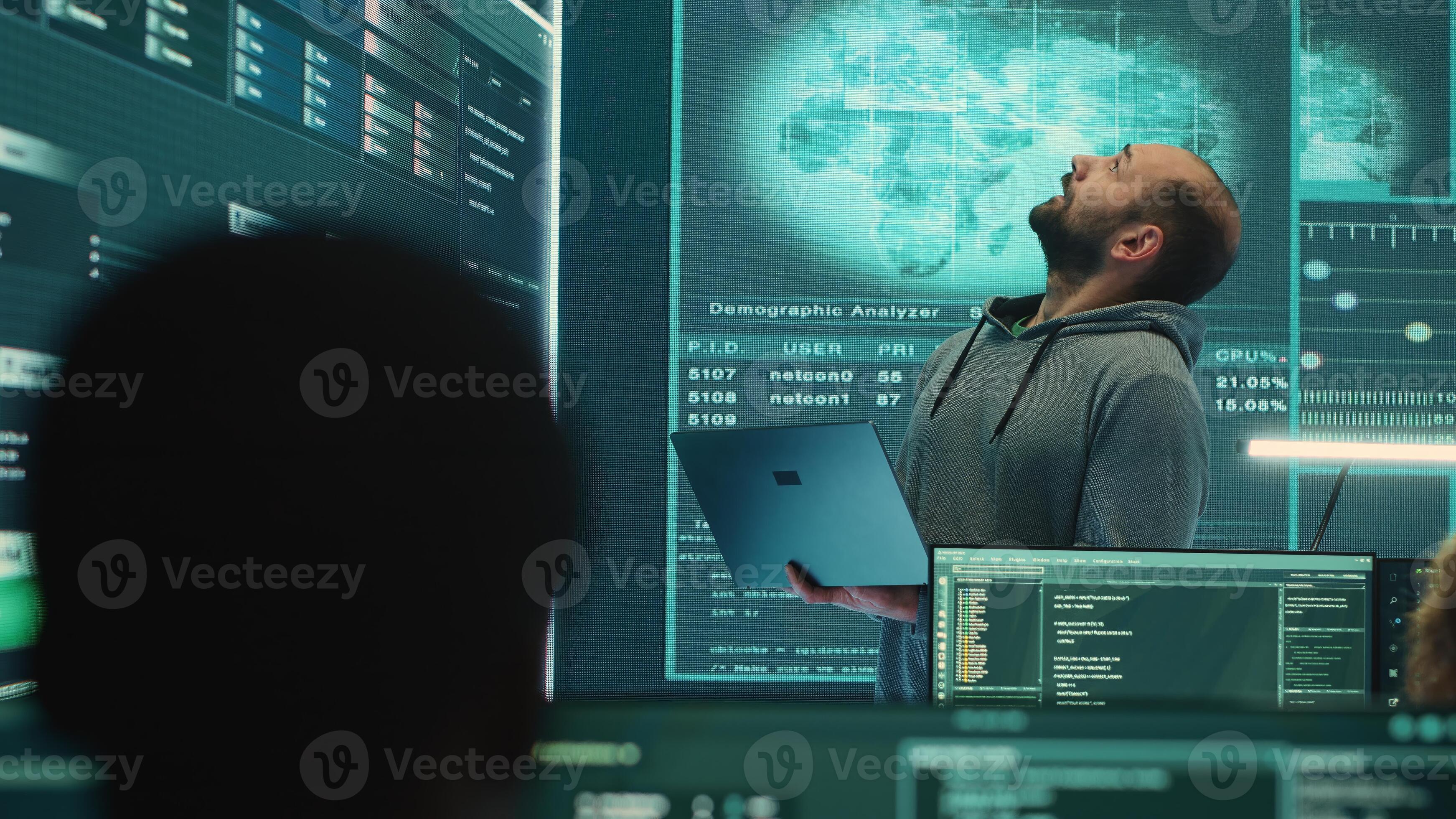 Cyber Defense Expert Examining Data On A Big Screen In Governmental