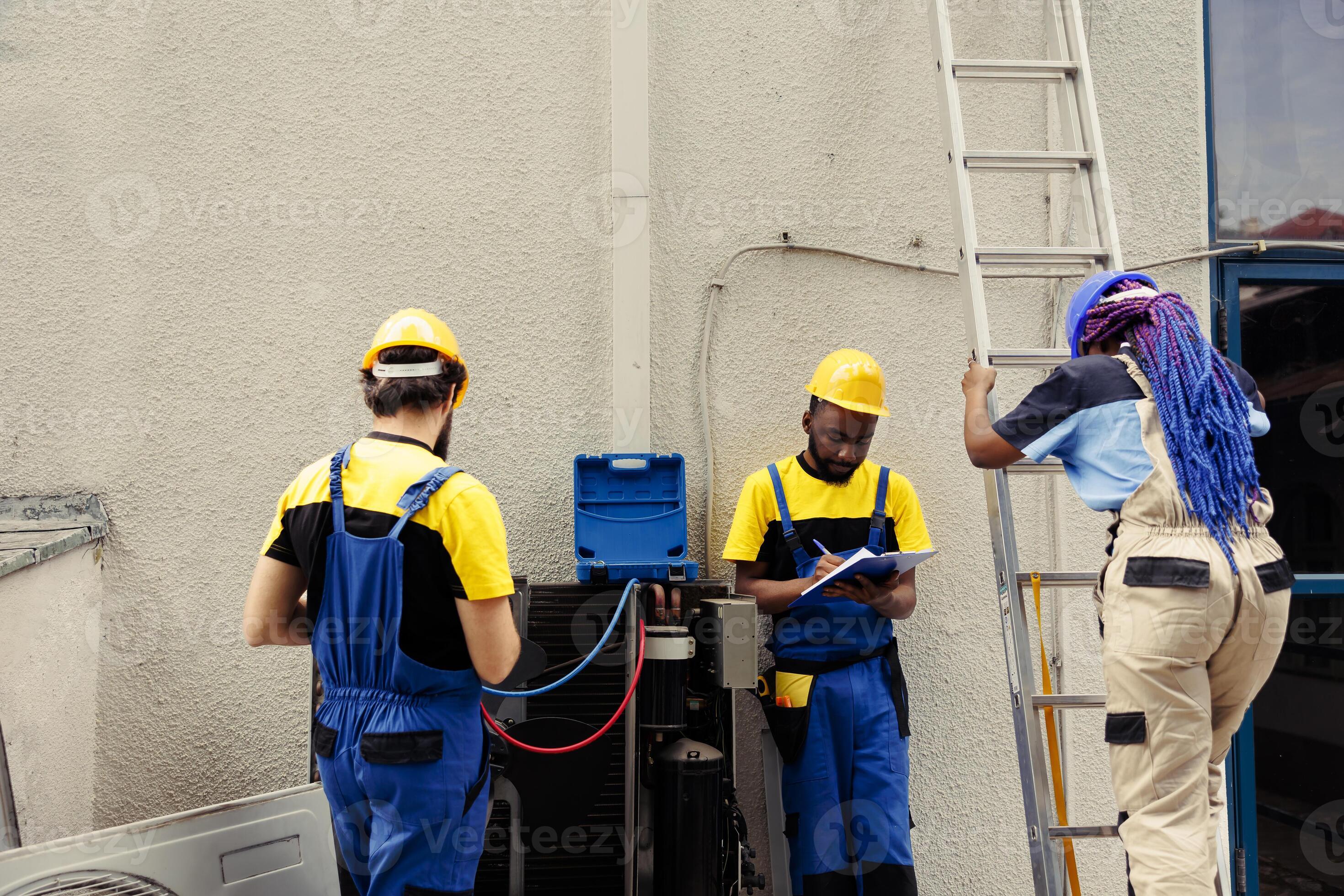Diverse team of knowleadgeable engineers using pressure measurement ... Diverse team of knowleadgeable engineers using pressure measurement ...