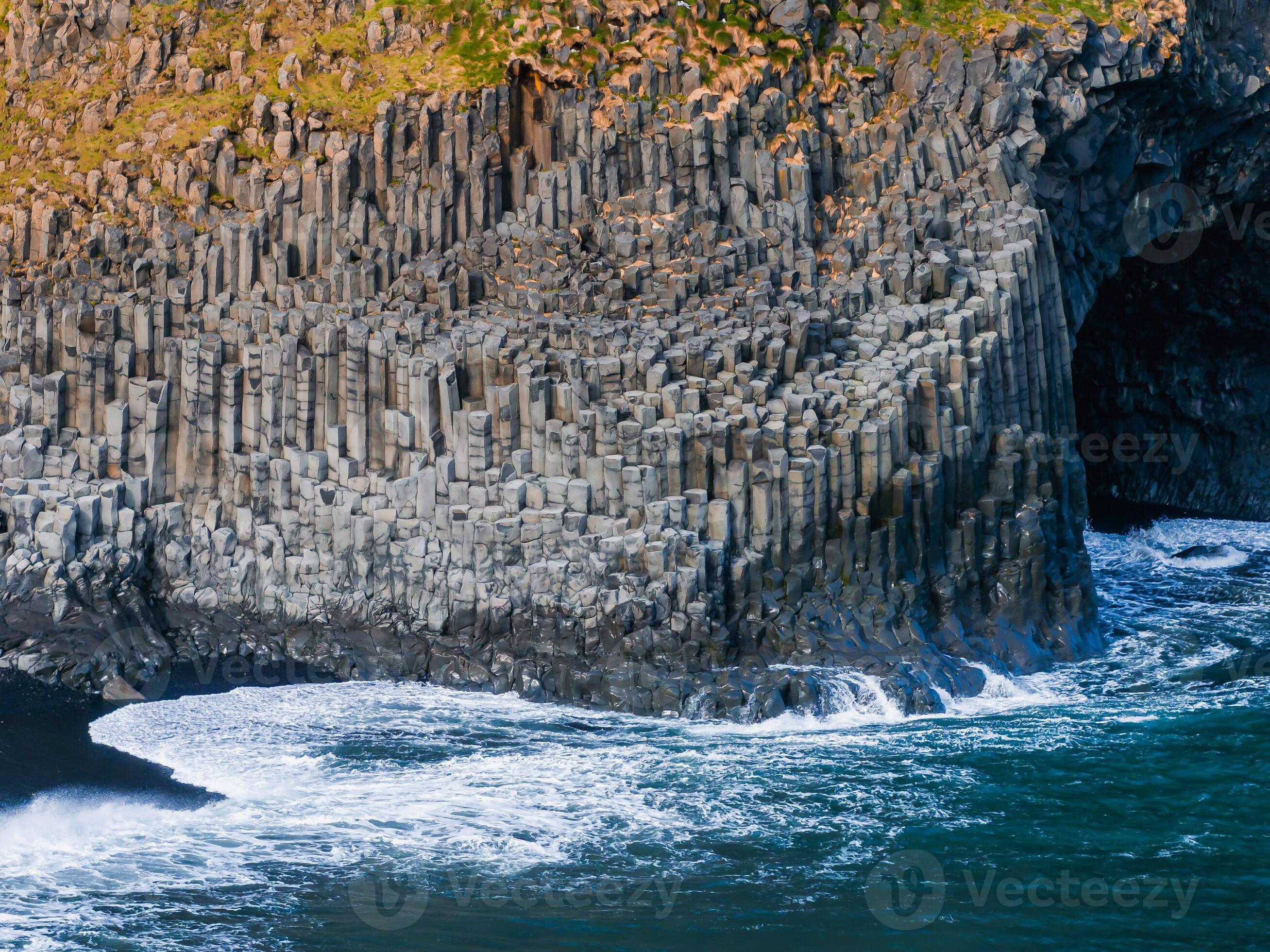 Hexagonal Basalt Columns on Icelandic Coast with Ocean Waves Crashing ... Hexagonal Basalt Columns on Icelandic Coast with Ocean Waves Crashing ...