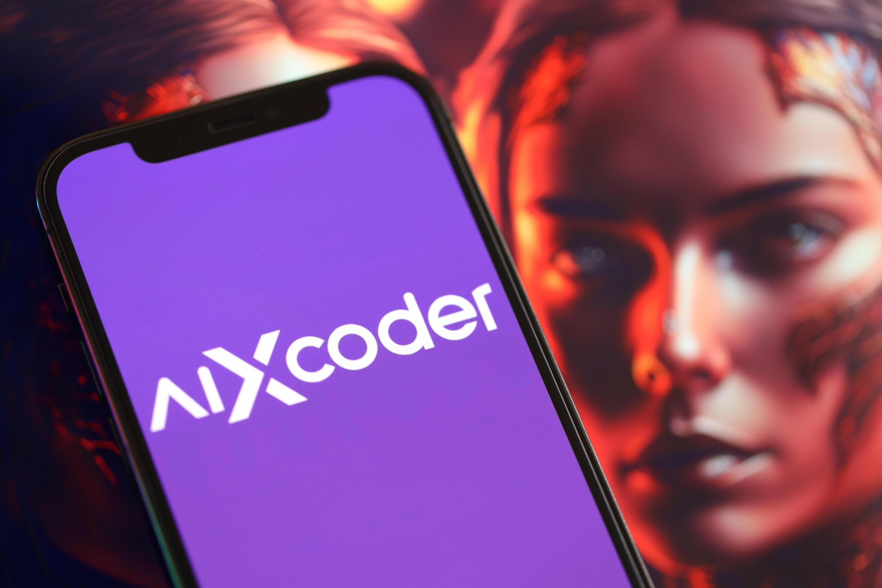 KYIV, UKRAINE - MARCH 17, 2024 AIXcoder logo on iPhone display screen with background of ...