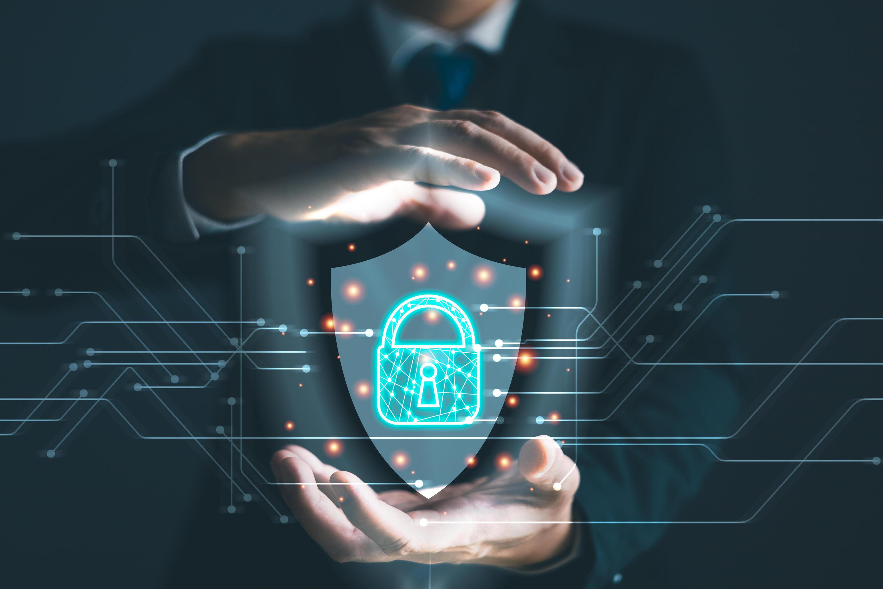 Businessmen protect personal data information from viruses on hand with ...