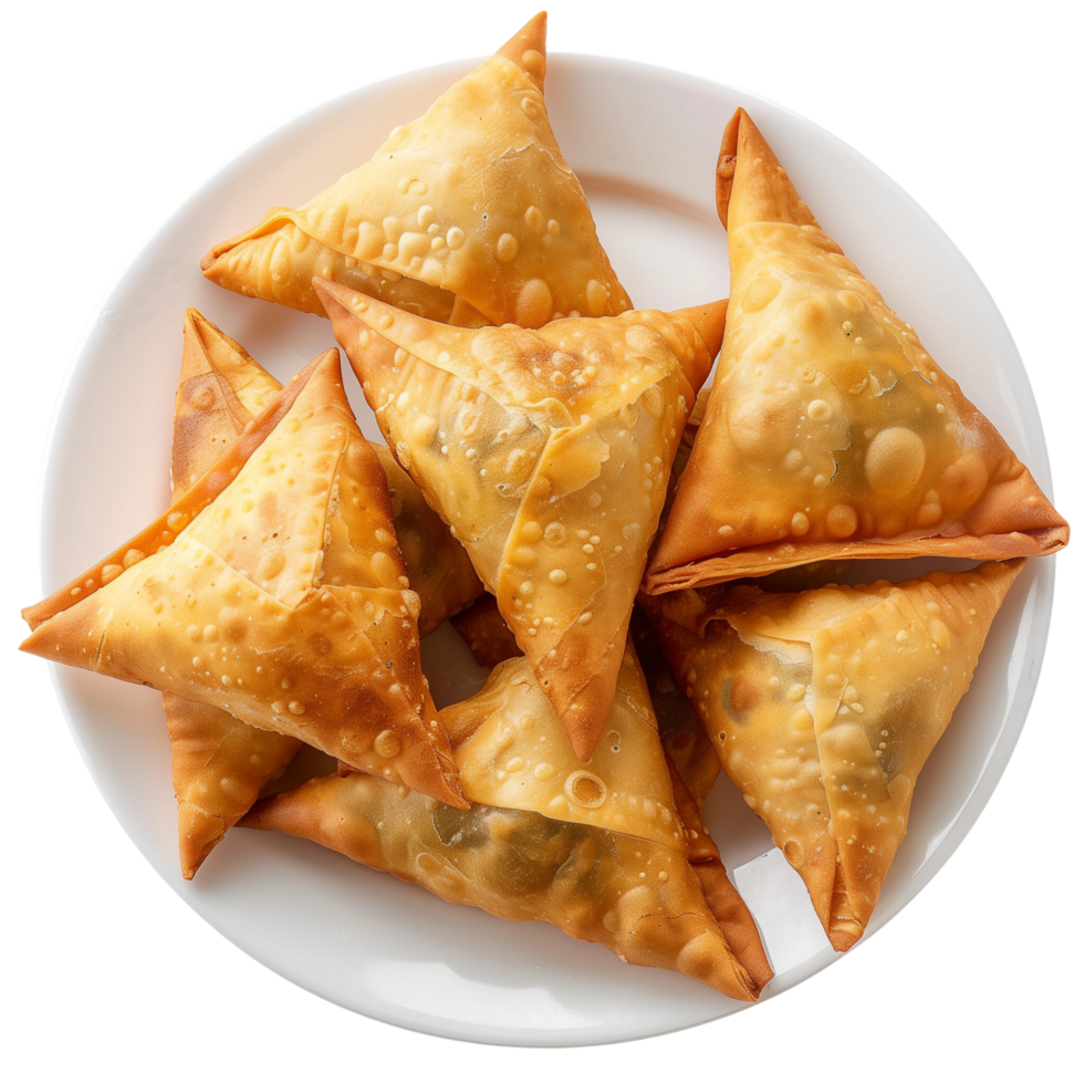 Vegetarian Indian samosas arranged in a plate, isolated on a ...