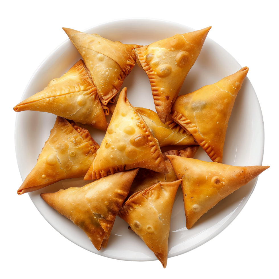 Vegetarian Indian samosas arranged in a plate, isolated on a ...