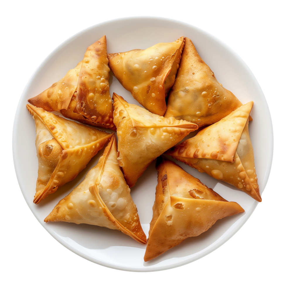 Vegetarian Indian samosas arranged in a plate, isolated on a ...