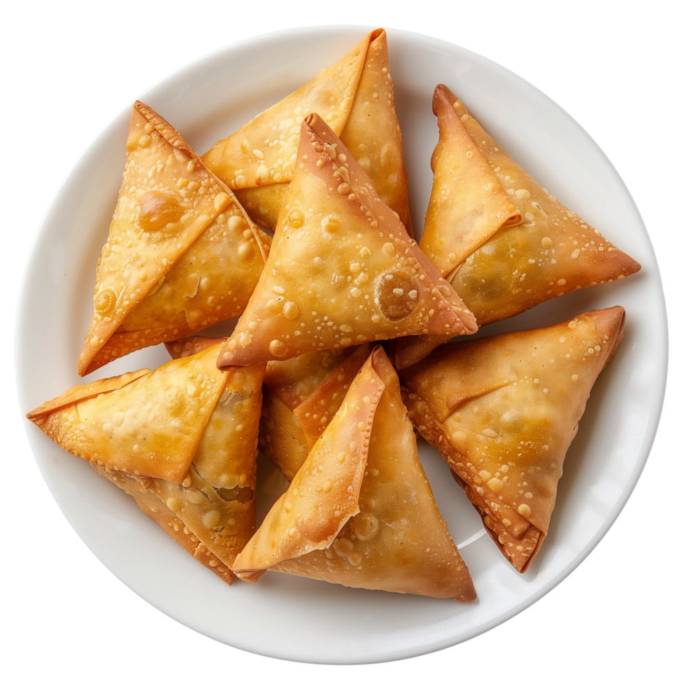Vegetarian Indian samosas arranged in a plate, isolated on a ...