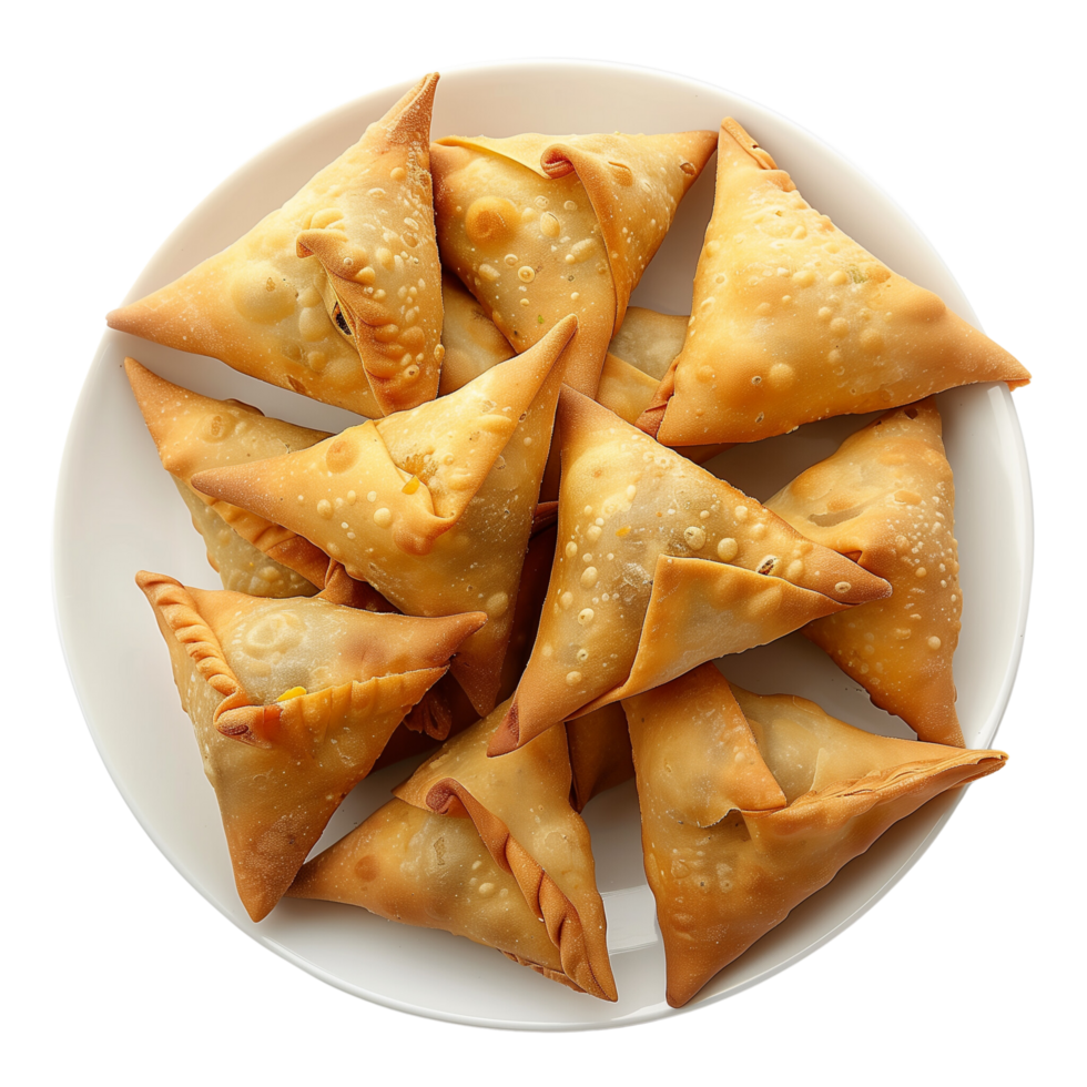 Vegetarian Indian samosas arranged in a plate, isolated on a ...