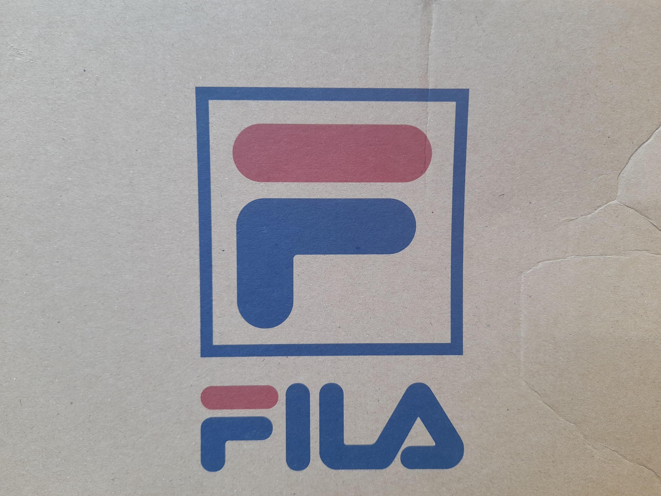 Lombok Island, Indonesia - July 16, 2024 - Italian shoe brand fila's logo on a cardboard box ...