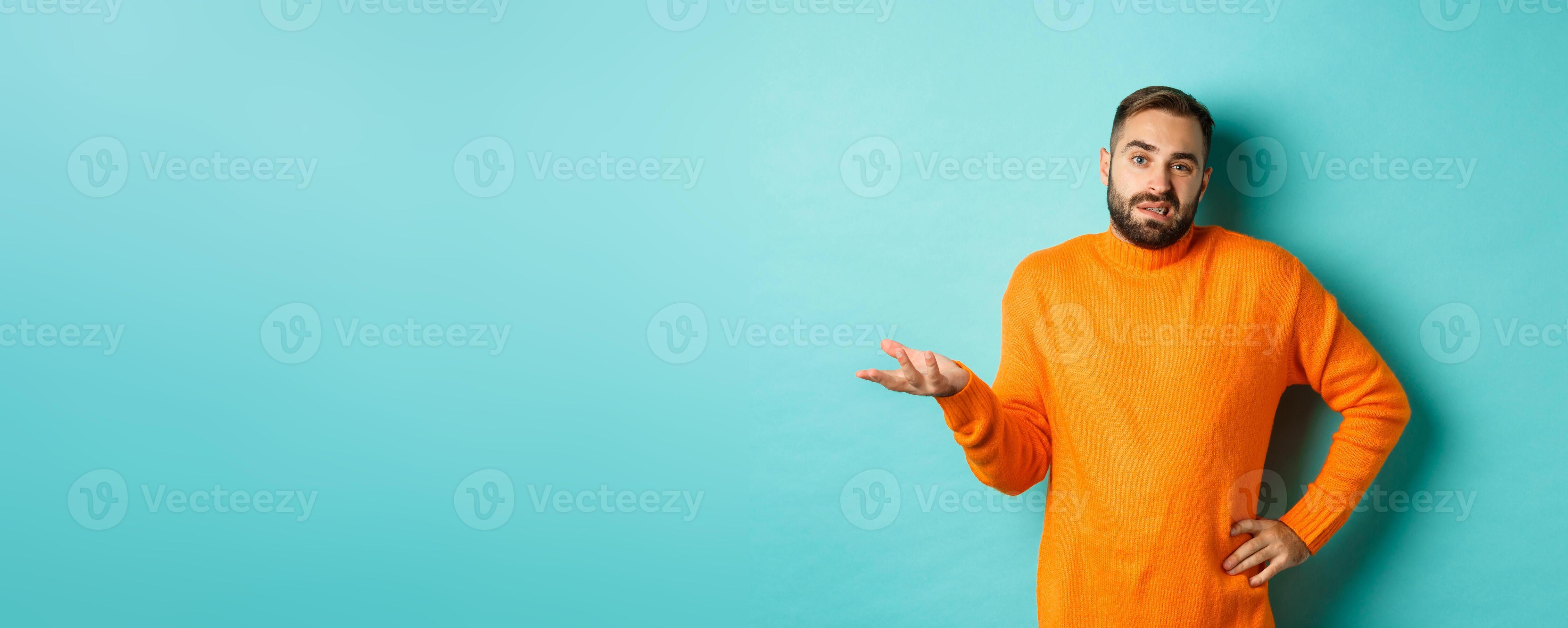 Careless and indifferent guy shrugging, looking unbothered, dont know ...